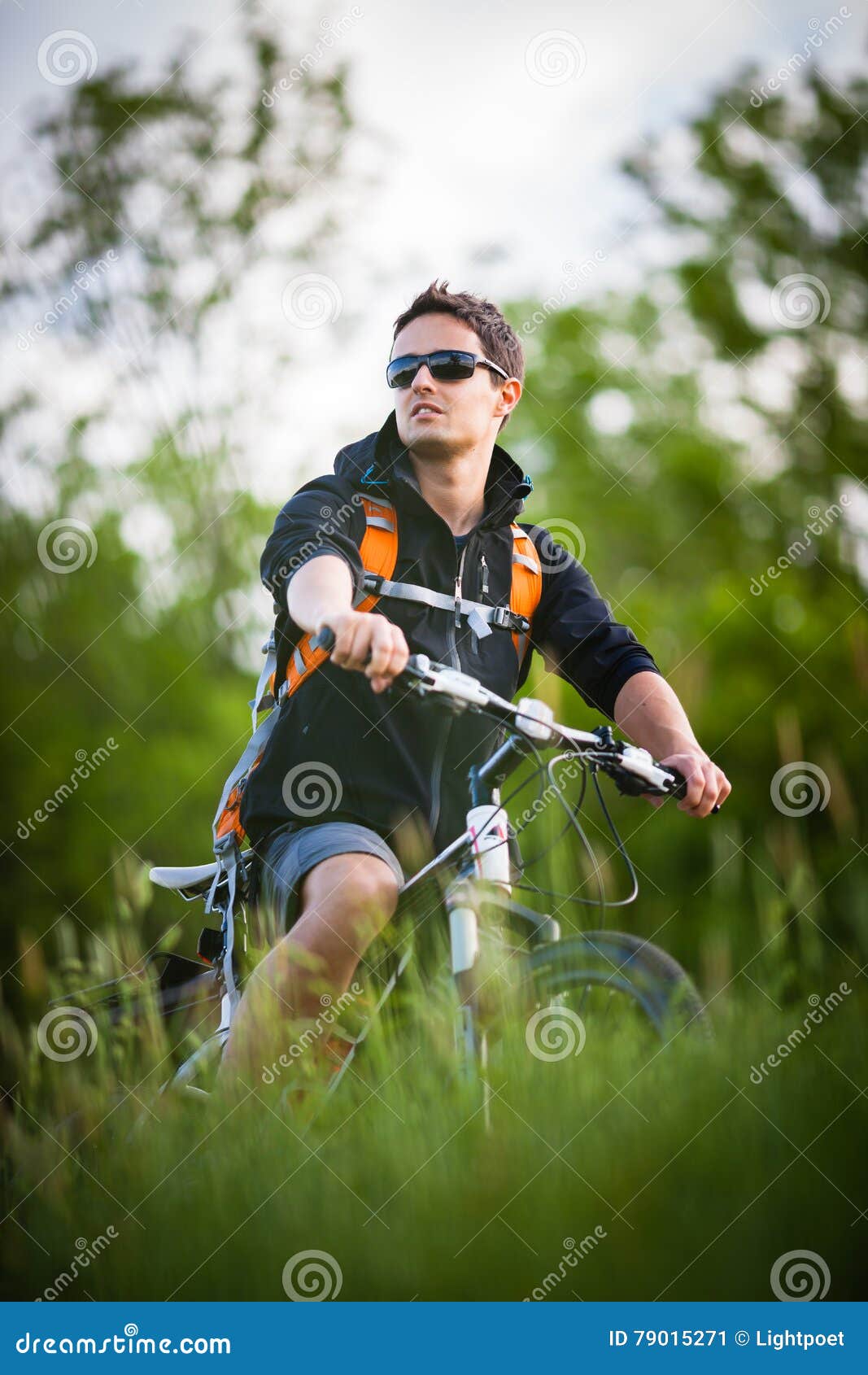 Handsome young man biking stock image. Image of happy - 79015271