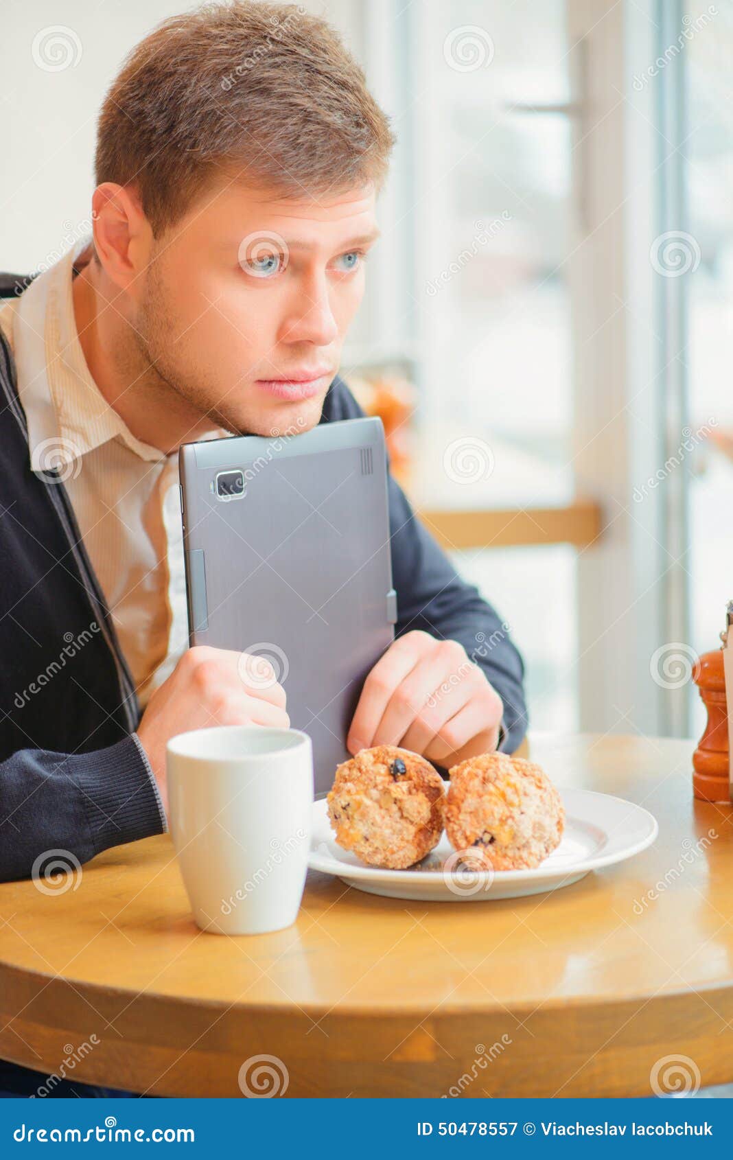 Handsome young man in cafe stock image. Image of ideas - 50478557