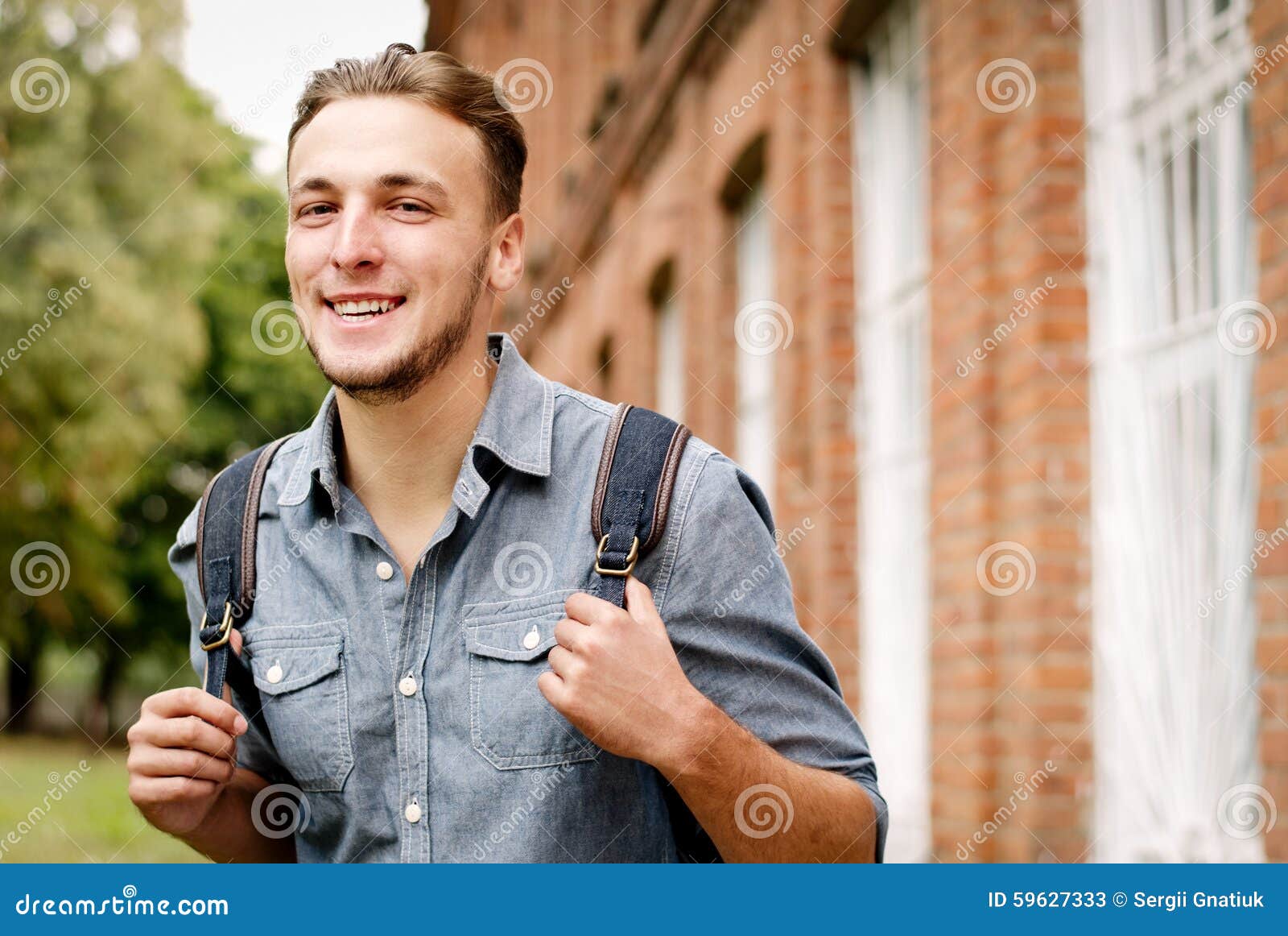 Handsome Young Man Carrying a Backpack Stock Image - Image of adult ...