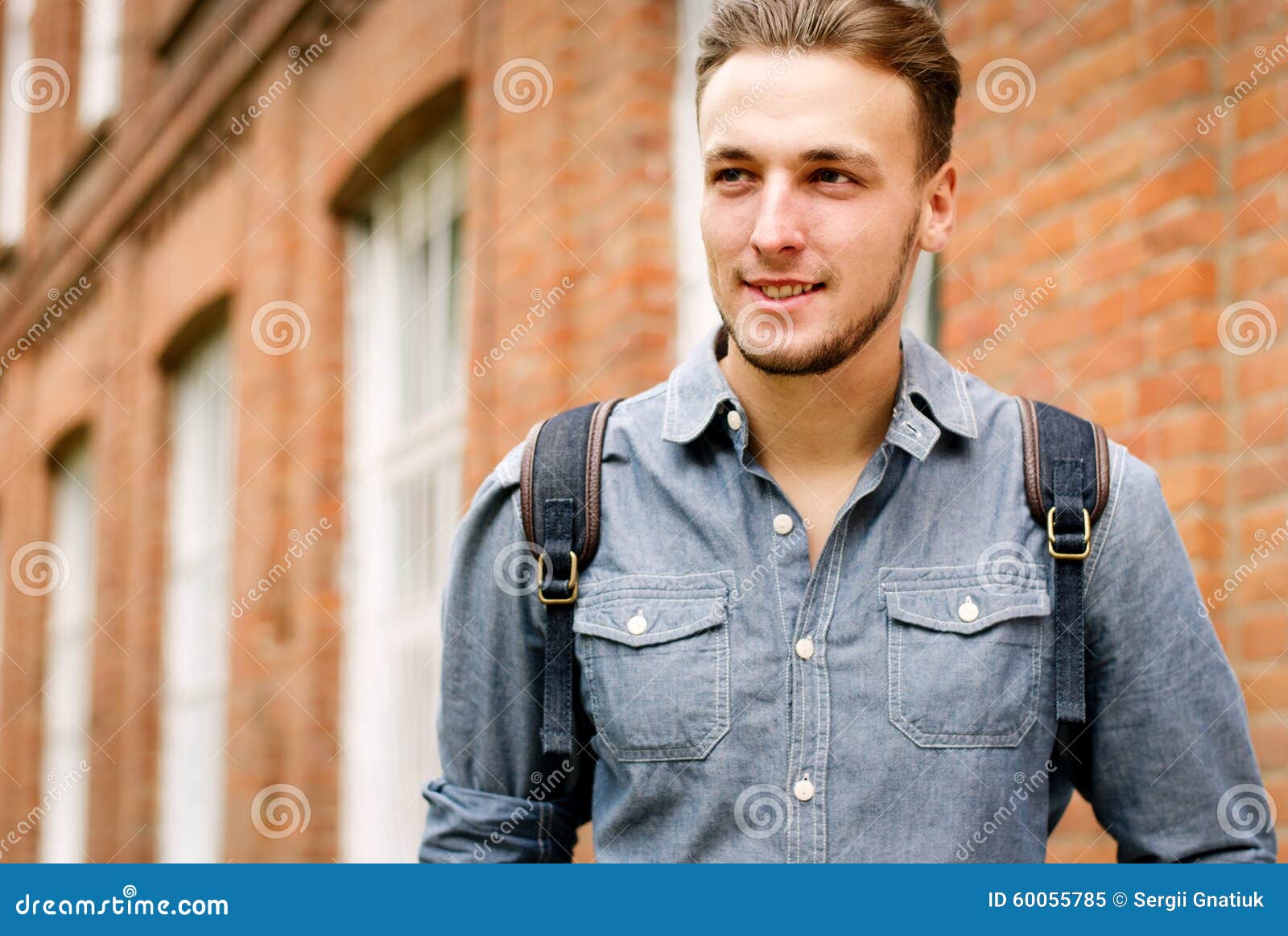 Handsome Young Man Carrying a Backpack Stock Image - Image of looking ...