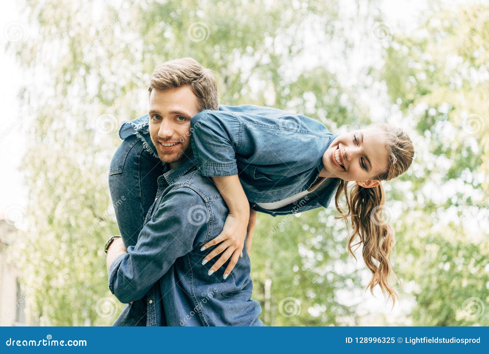 Handsome Young Man Carrying His Smiling Girlfriend Stock Image - Image ...