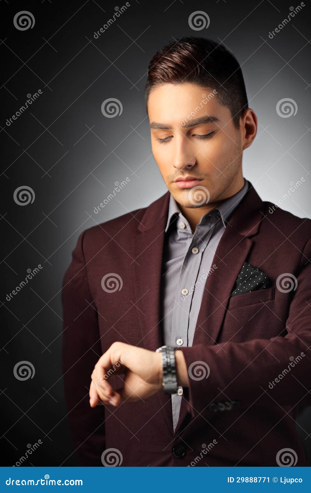 Handsome Man Checking the Time on His Wrist Watch Stock Image - Image ...