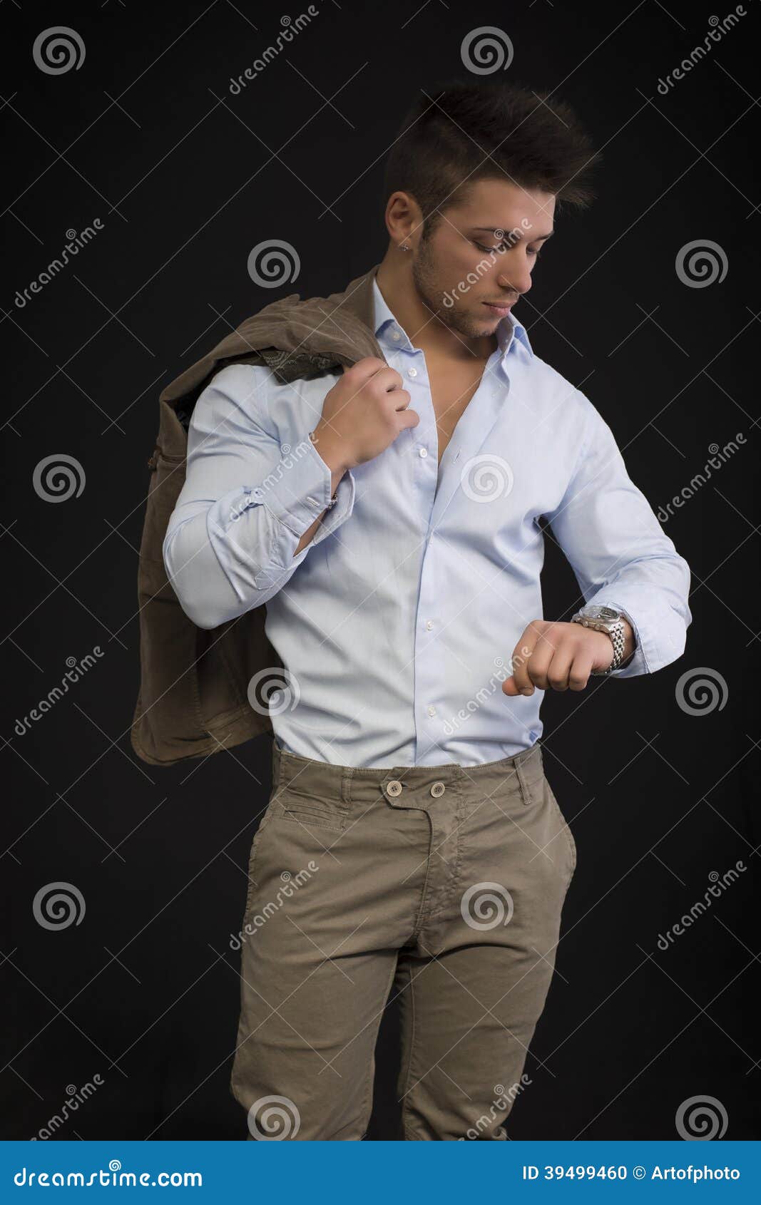 Handsome Young Man Checking Watch on His Wrist Stock Photo - Image of ...