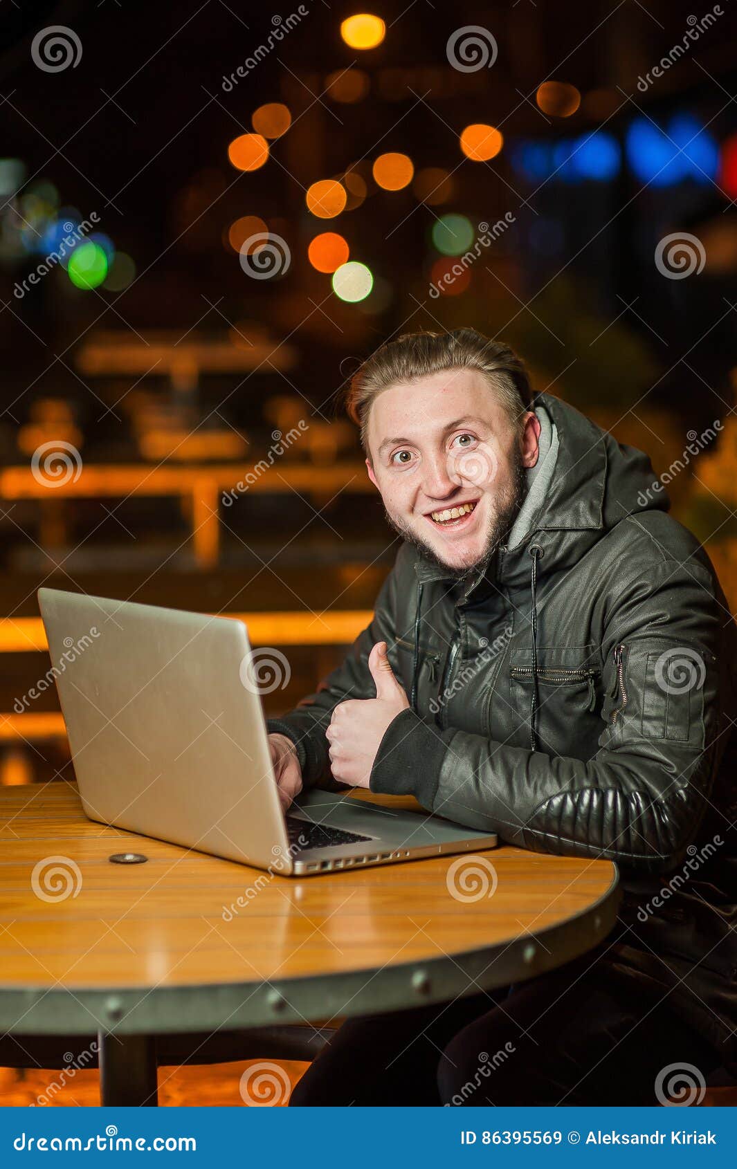 Handsome Young Man with a Computer on the Street Stock Image - Image of ...