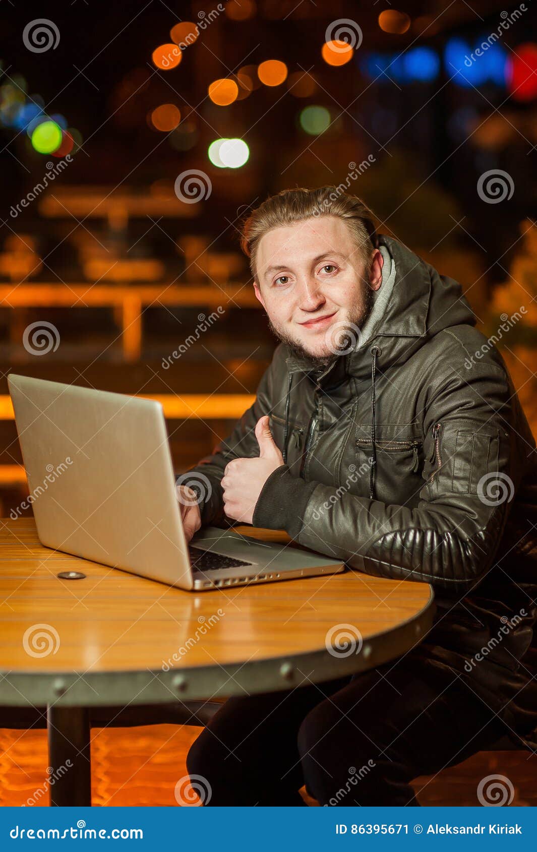 Handsome Young Man with a Computer on the Street Stock Image - Image of ...