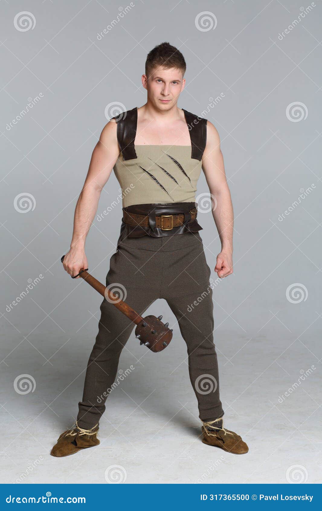Handsome Young Man in Costume with a Mace in His Stock Photo - Image of ...