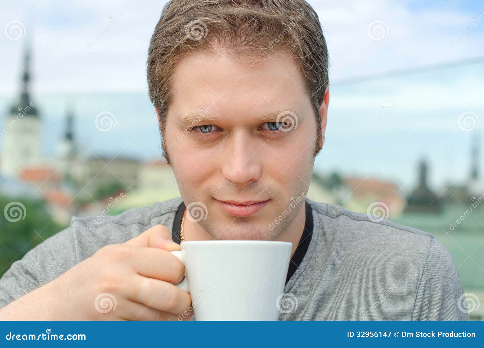 Handsome Young Man with Cup Stock Image - Image of town, leisure: 32956147
