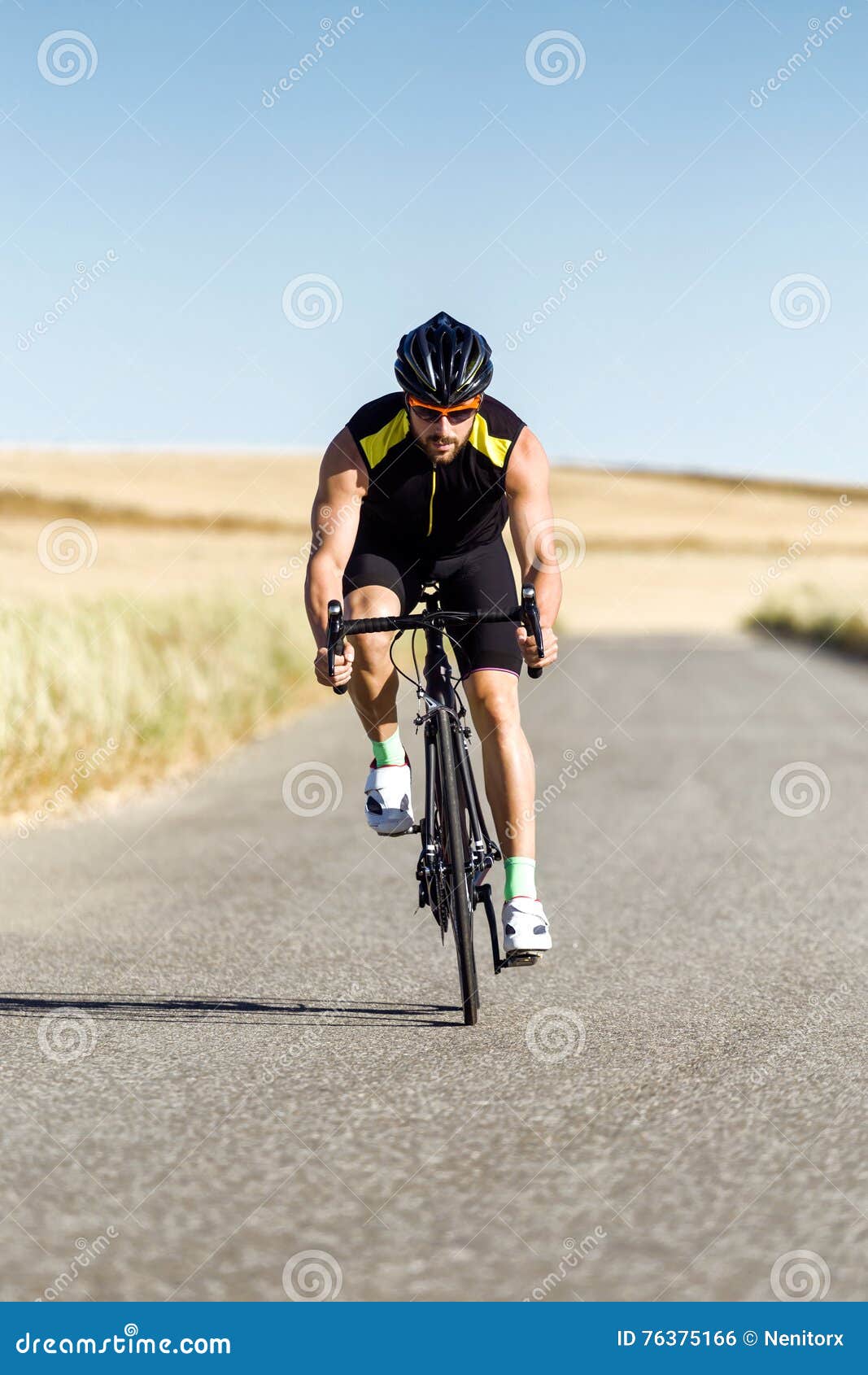 Handsome Young Man Cycling on the Road. Stock Photo - Image of bike ...