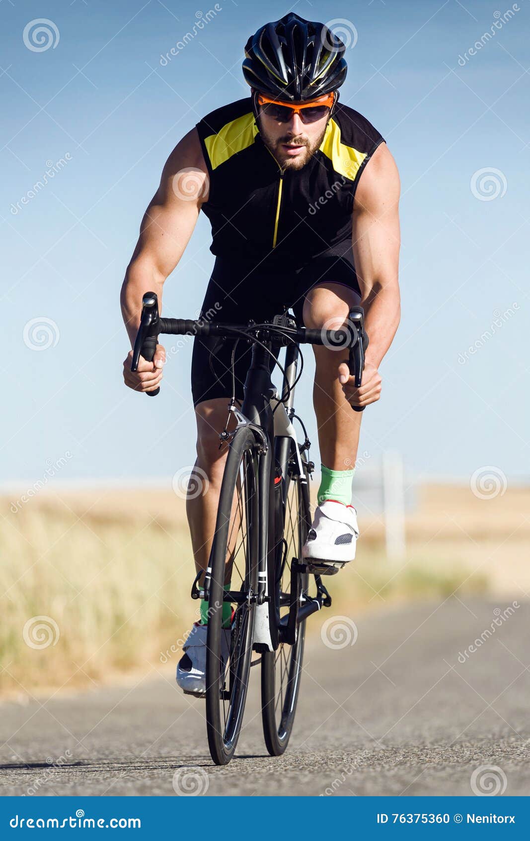 Handsome Young Man Cycling on the Road. Stock Photo - Image of male ...