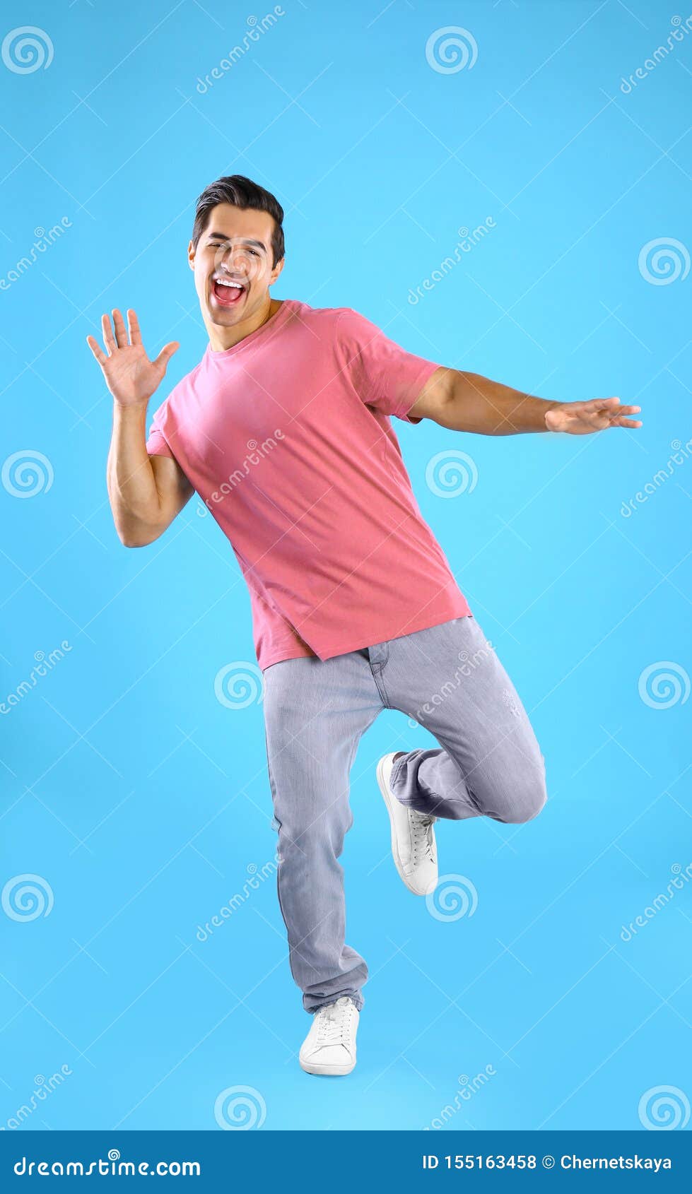 Handsome Young Man Dancing on Blue Stock Photo - Image of disco ...