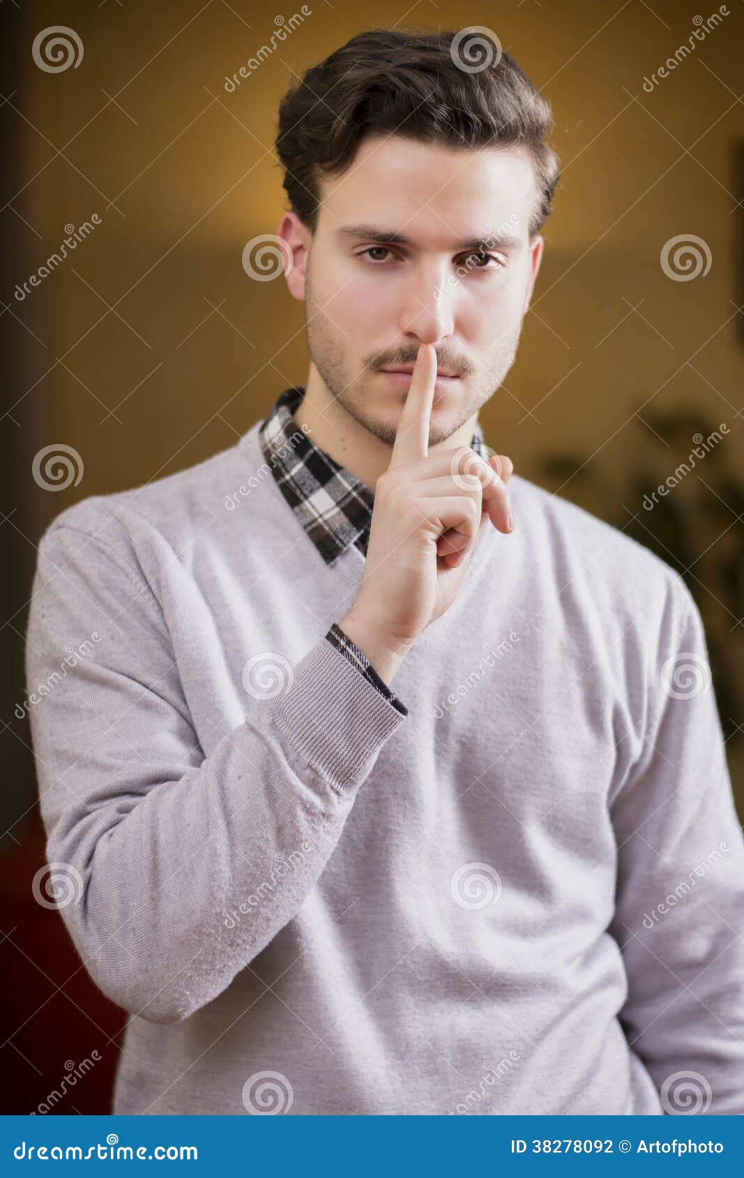 Handsome Young Man Doing Hush Sign with Finger on Lips Stock Photo ...