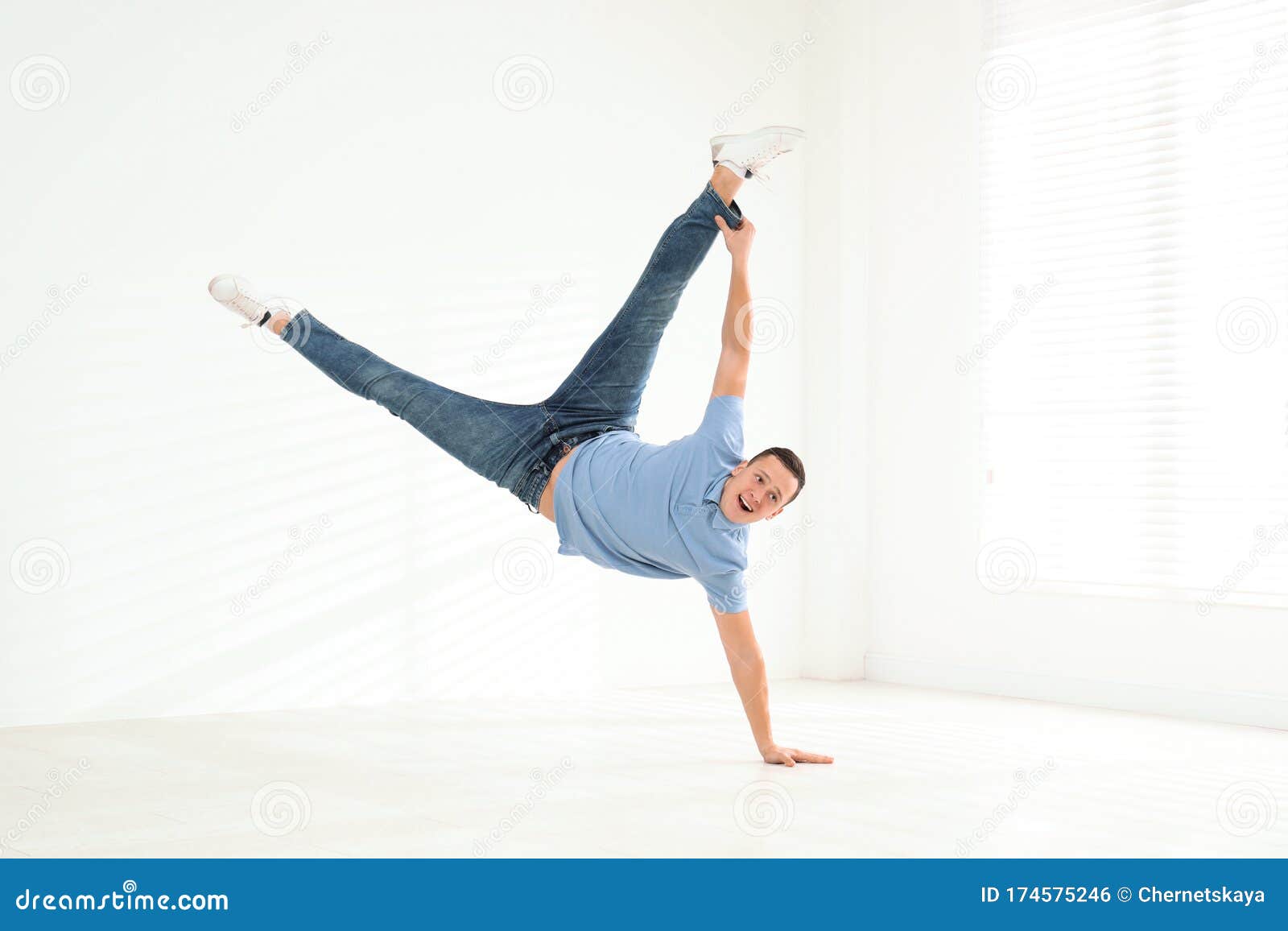 Handsome Young Man Doing Trick. Modern Dance Stock Photo - Image of ...