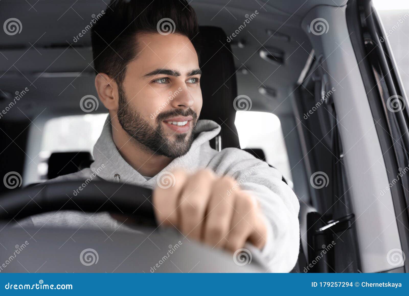 Handsome Young Man Driving His Car Stock Photo - Image of driver, happy ...