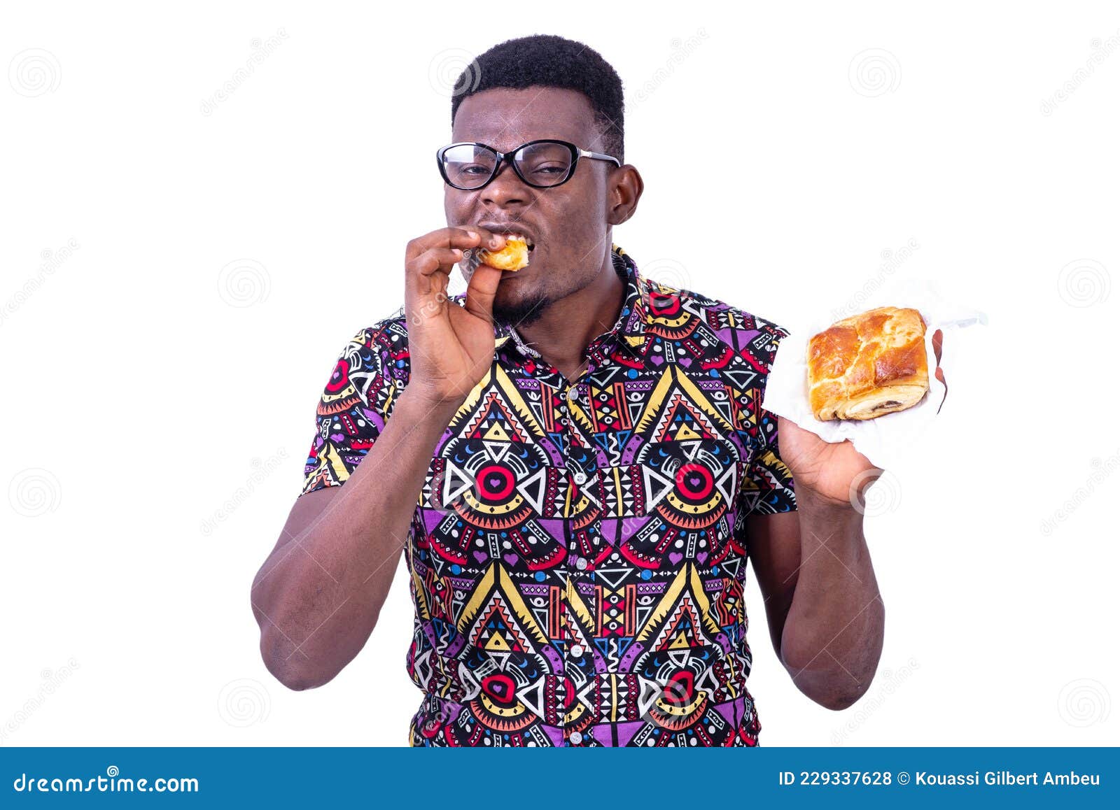Handsome Young Man Eating Croissant Stock Photo - Image of adult ...