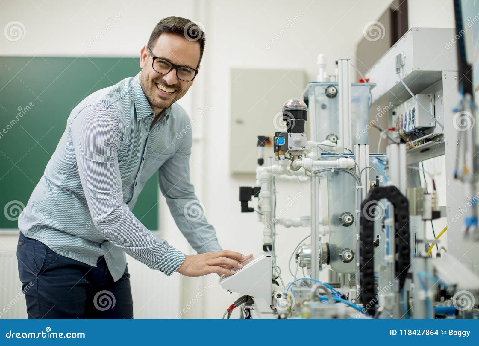 Handsome Young Man in the Electronic Workshop Stock Photo - Image of ...