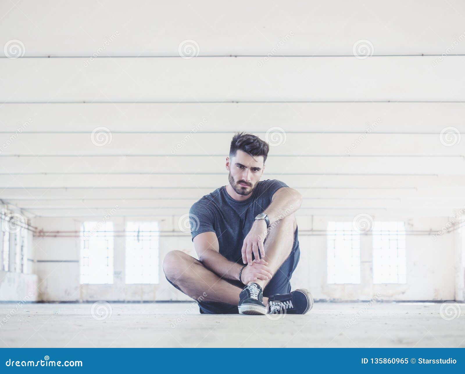 Handsome Young Man in Empty Warehouse Stock Image - Image of adult ...