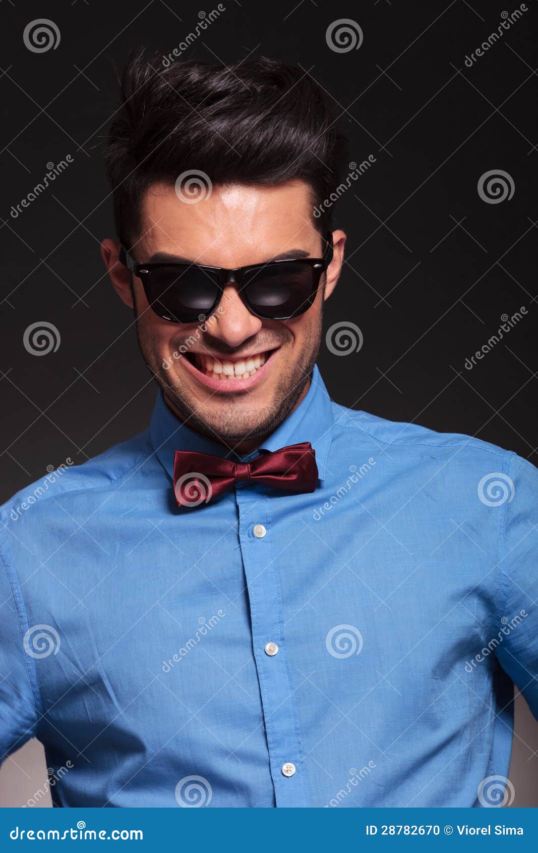 Handsome Young Man Enjoying Himself Stock Photo - Image of alone, grey ...