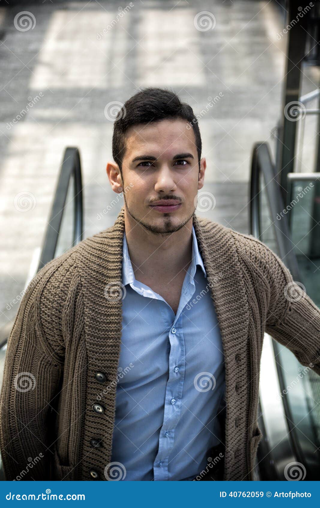 Handsome Young Man on Escalators Stock Image - Image of escalator ...