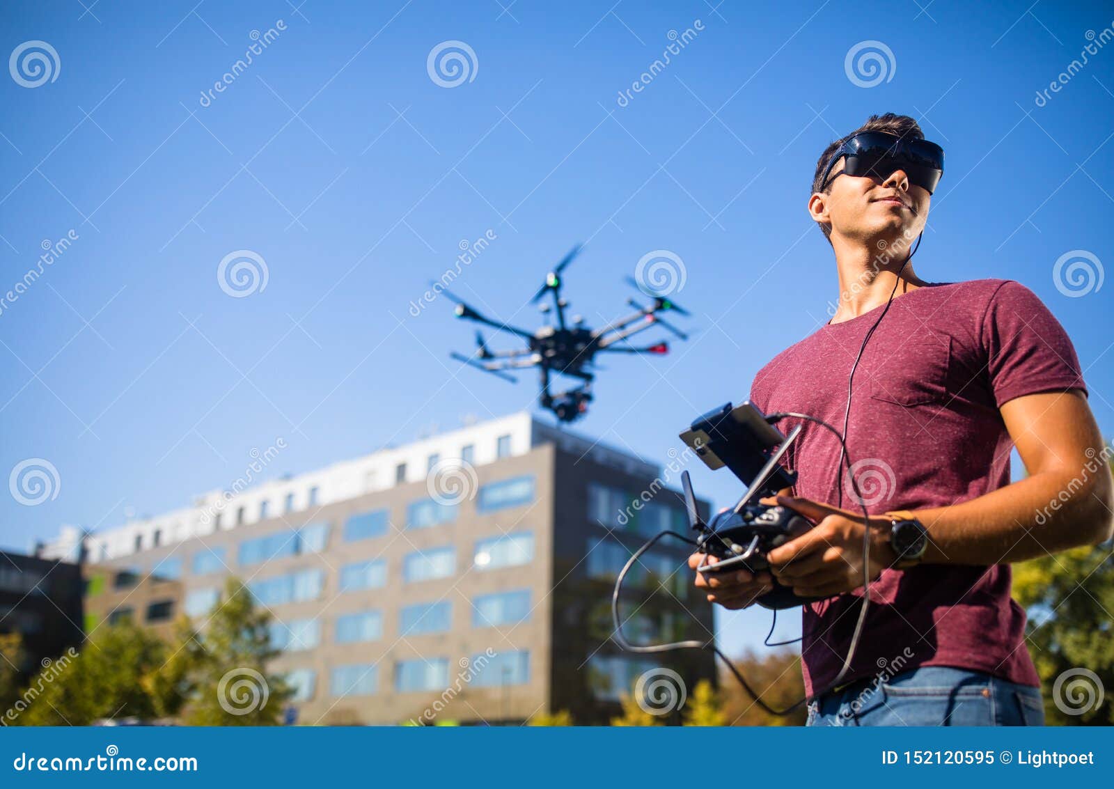 Handsome Young Man Flying a Drone Outdoors Stock Image - Image of ...