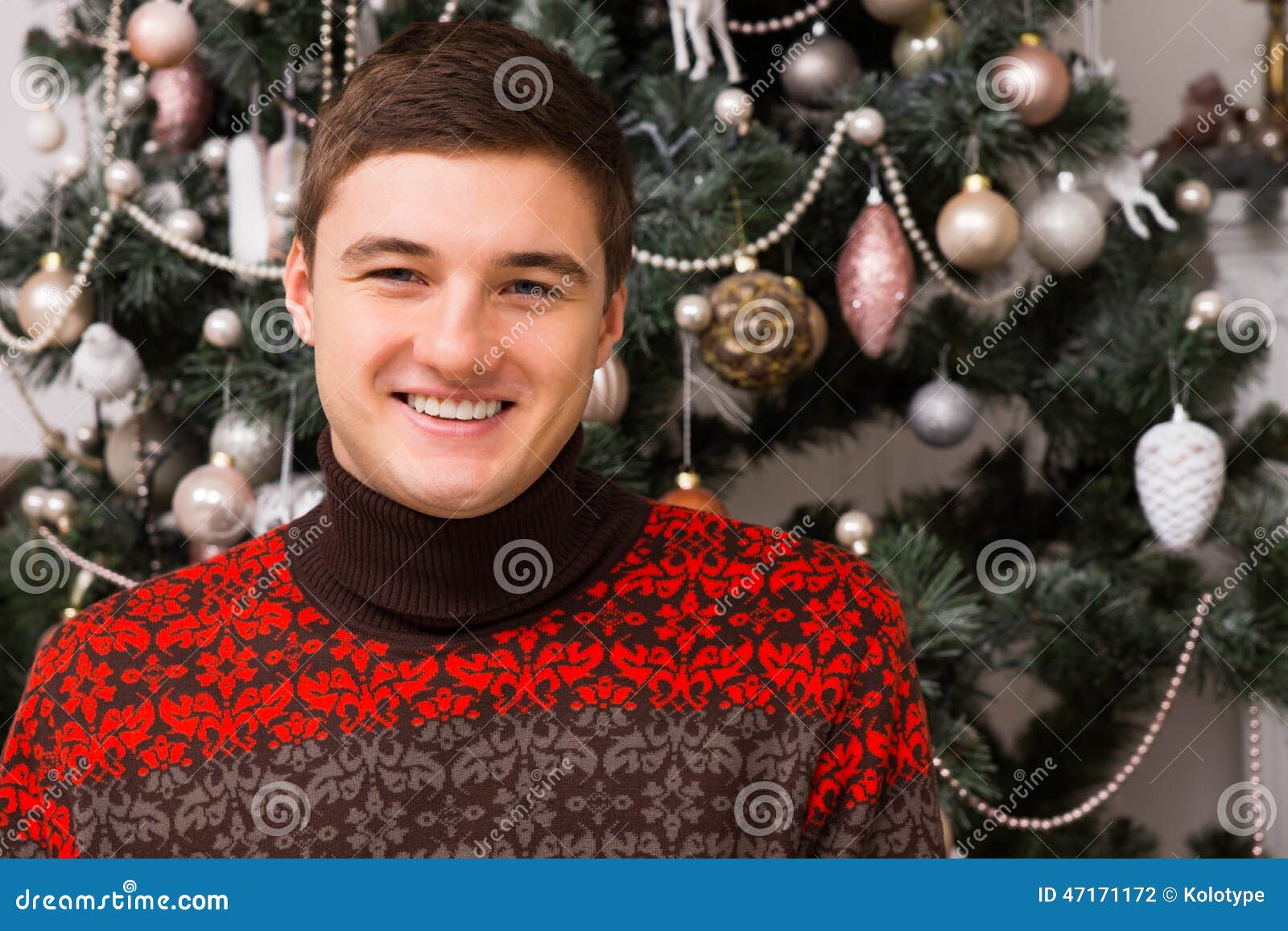 Handsome Young Man in Front of a Xmas Tree Stock Photo - Image of happy ...