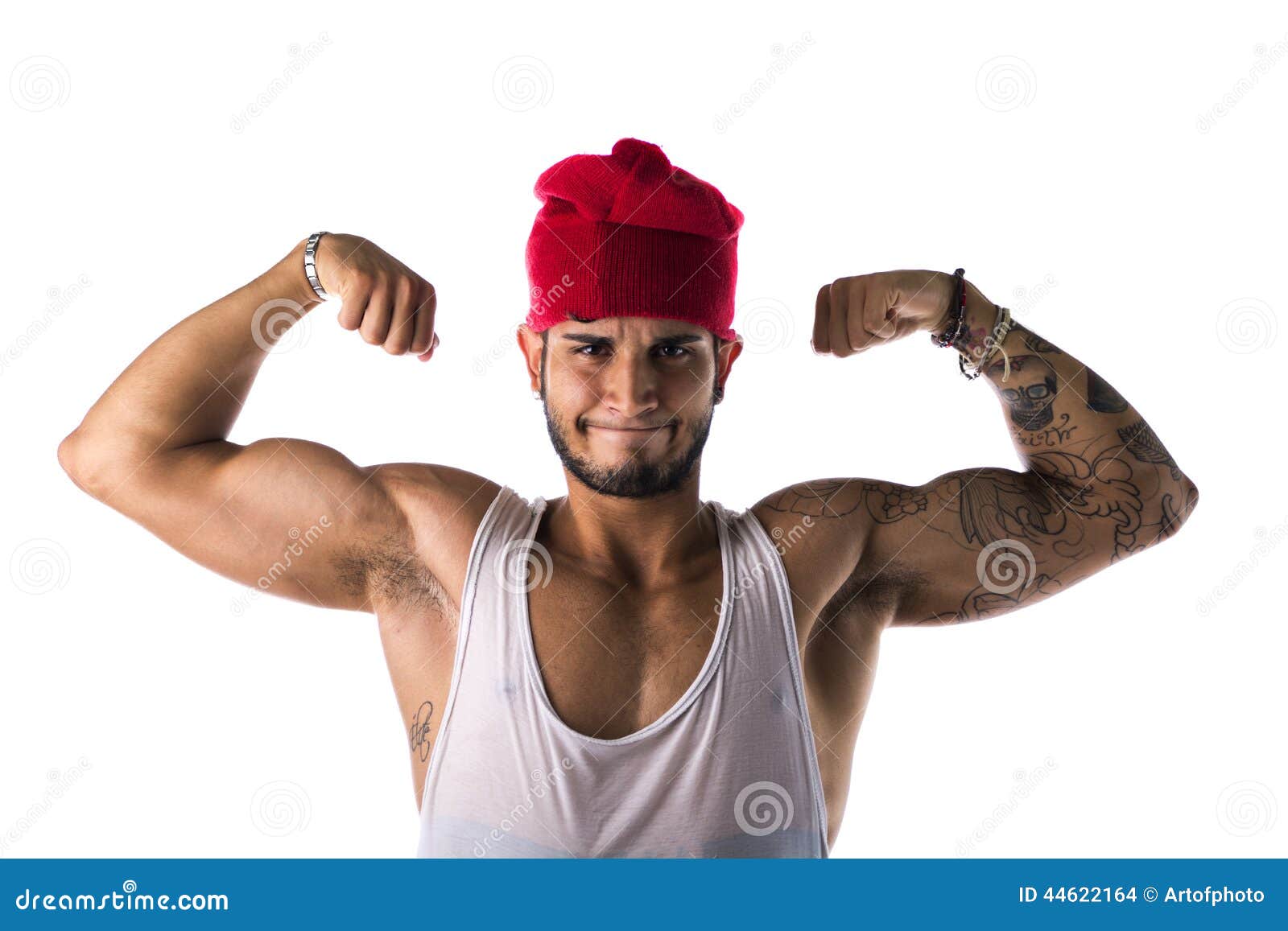 Handsome Young Man in Funny Red Hat Doing Silly Expression Stock Photo ...