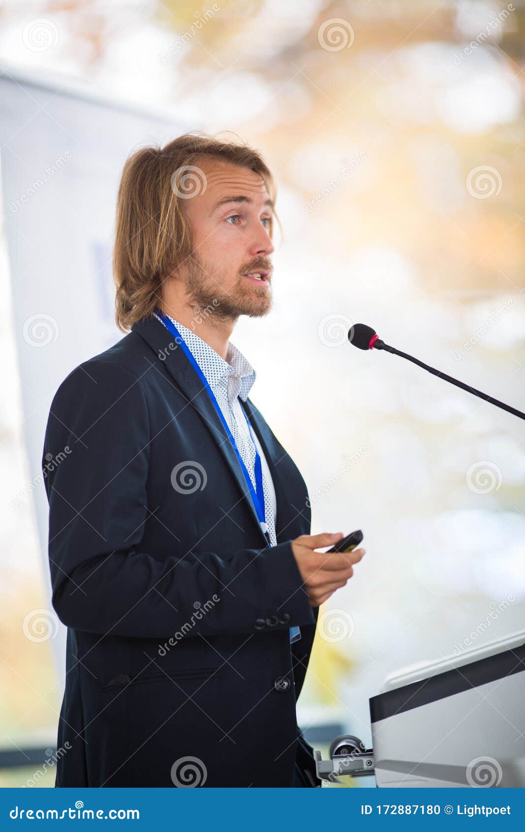 Handsome Young Man at a Conference Stock Photo - Image of communication ...