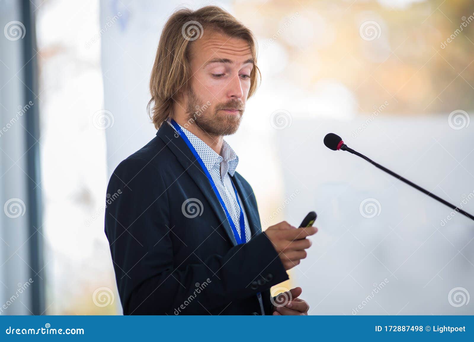 Handsome Young Man at a Conference Stock Photo - Image of male, indoors ...