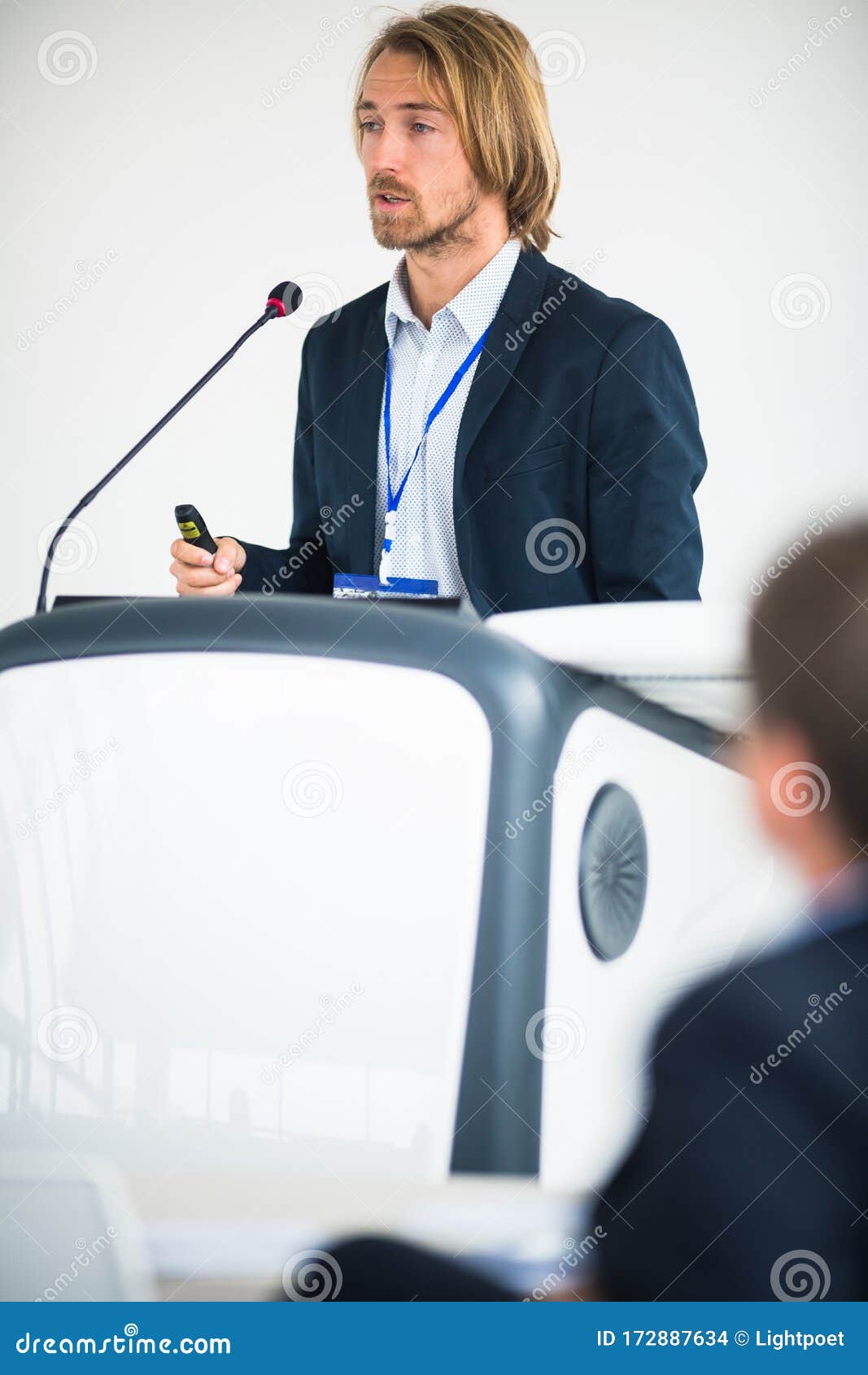 Handsome Young Man at a Conference Stock Photo - Image of education ...