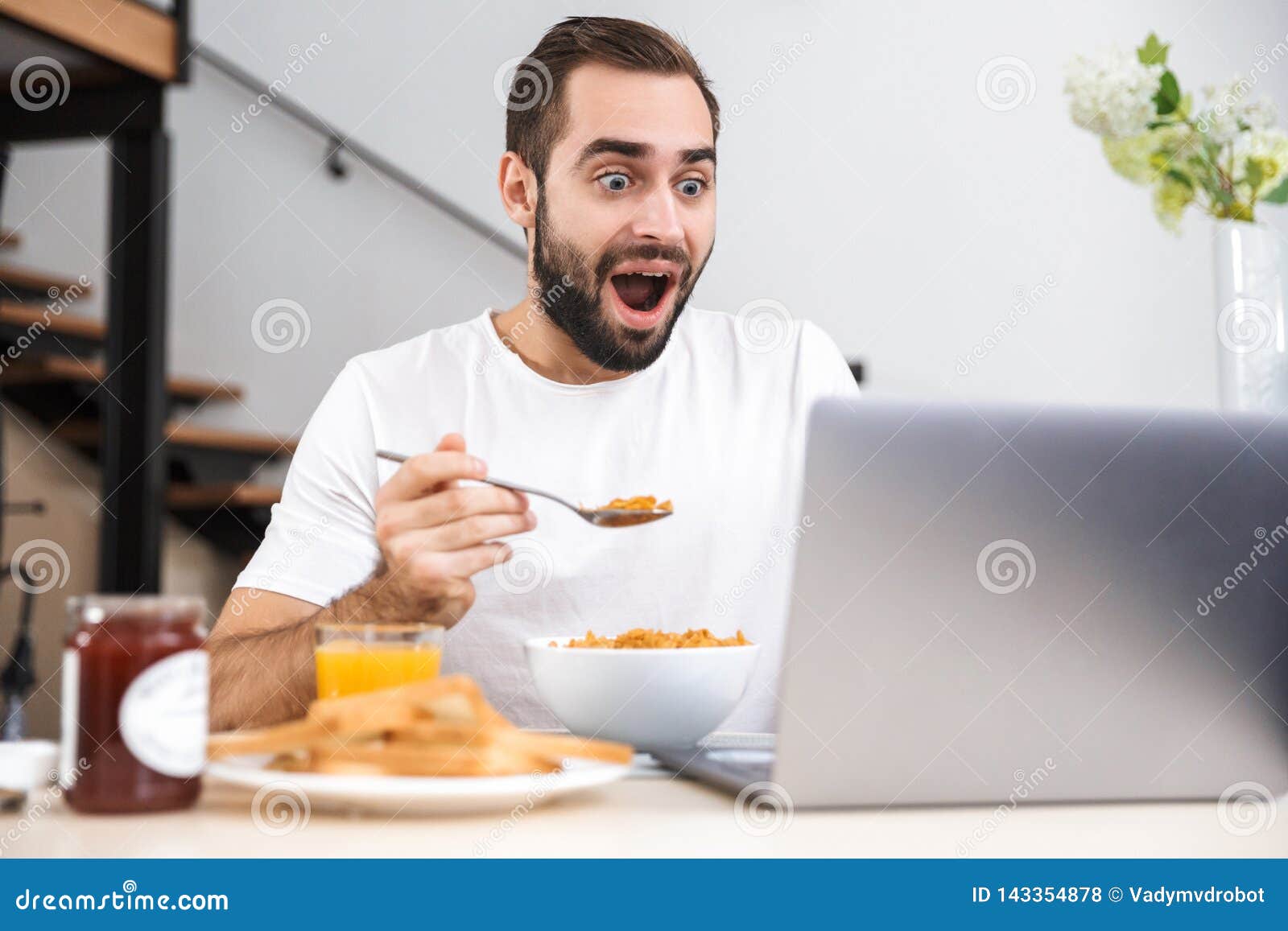 Handsome Young Man Having Breakfast Stock Photo - Image of inside, card ...
