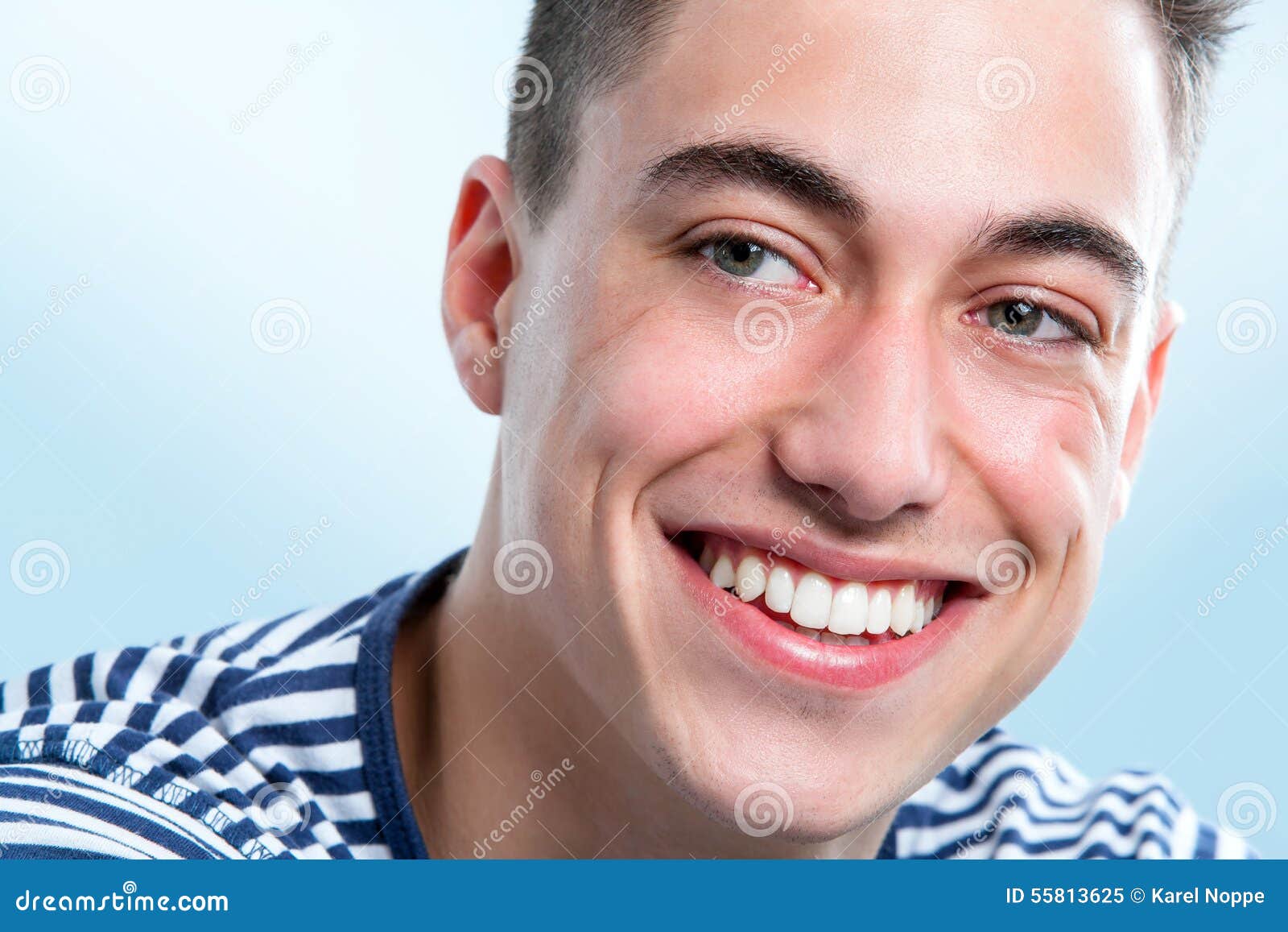 Handsome Young Man with Healthy Teeth Looking Aside. Stock Image ...