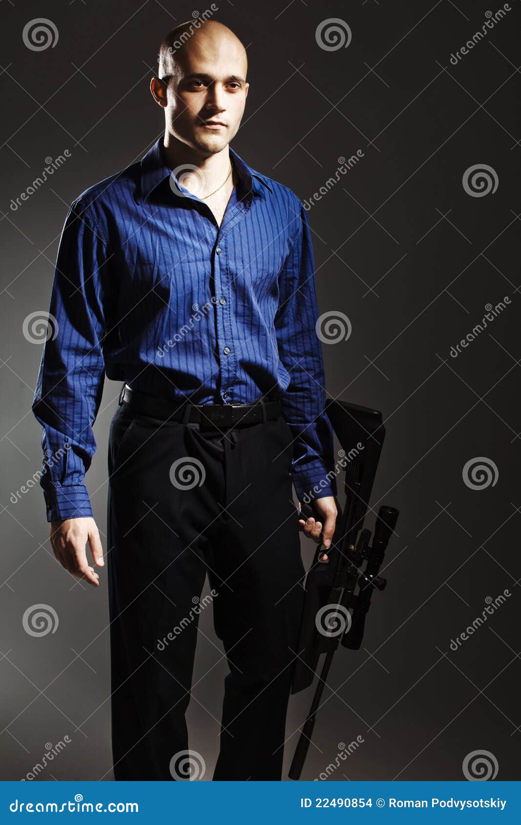 Handsome Young Man Holding a Gun. Stock Photo - Image of portrait ...