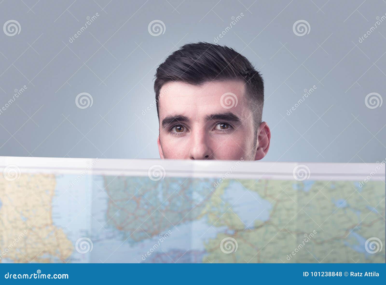 Young man holding map stock photo. Image of outlook - 101238848