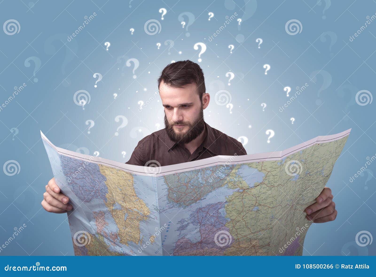 Young man holding map stock photo. Image of active, destination - 108500266