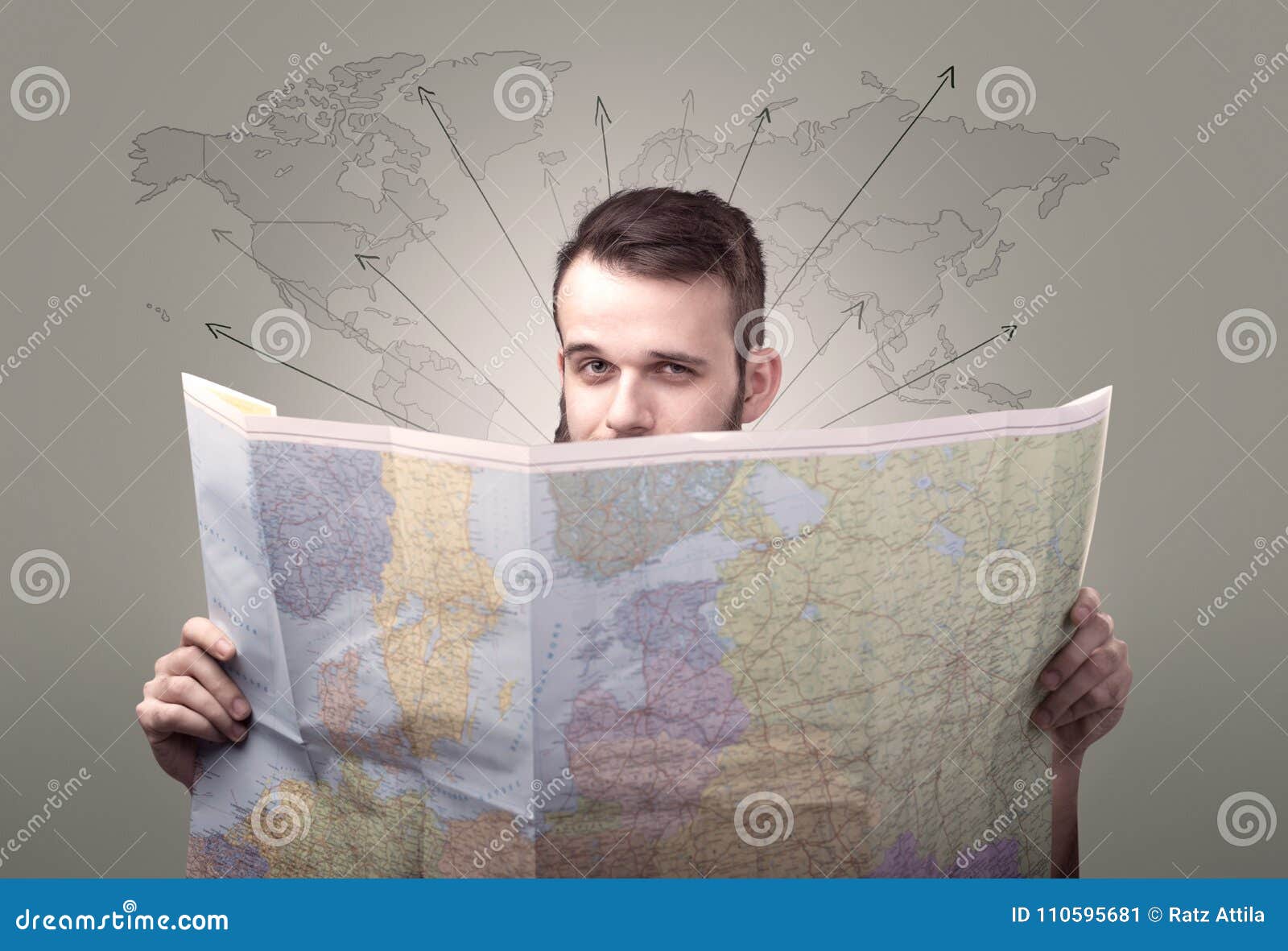 Young man holding map stock image. Image of decision - 110595681