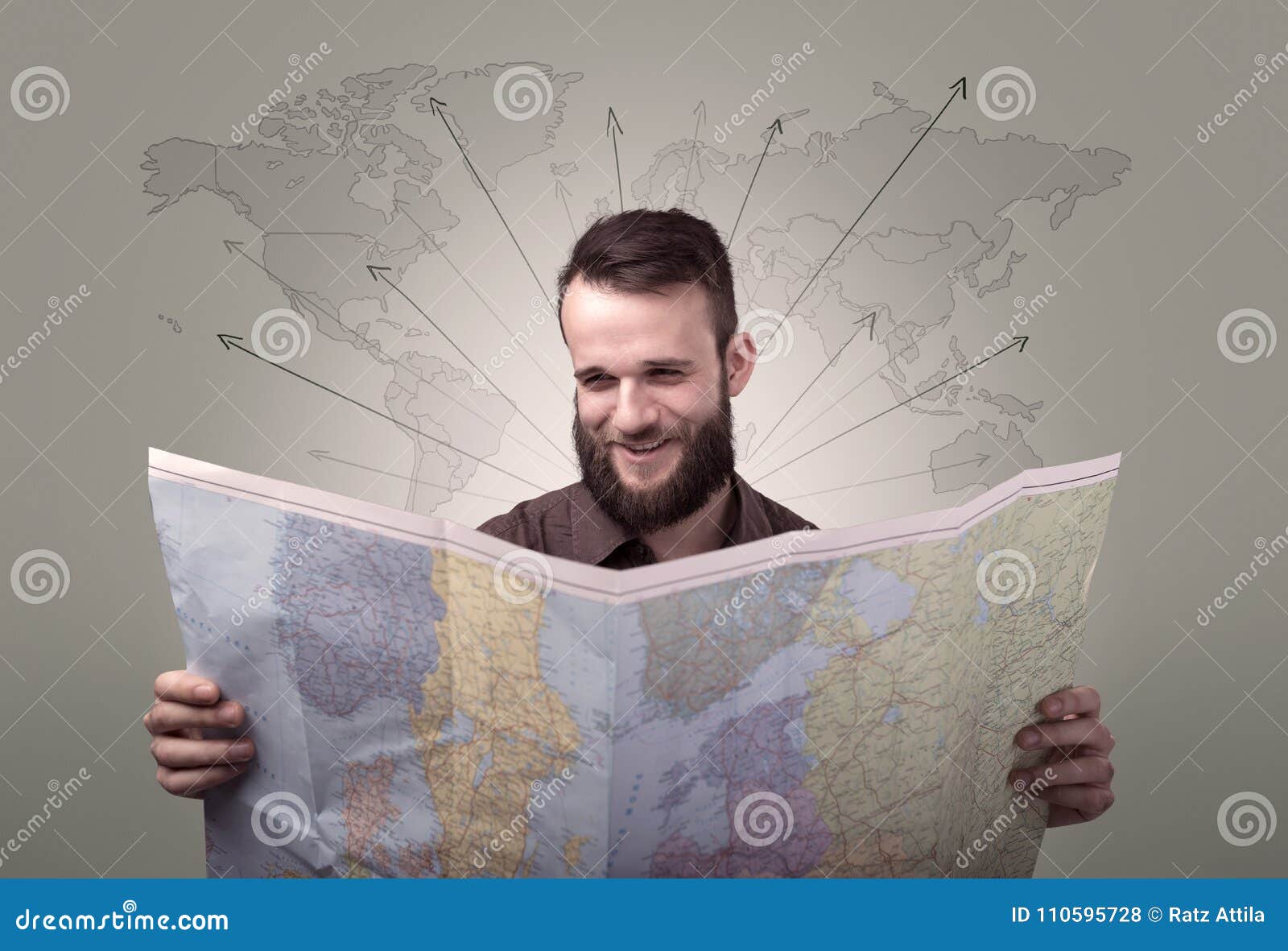 Young man holding map stock photo. Image of interest - 110595728