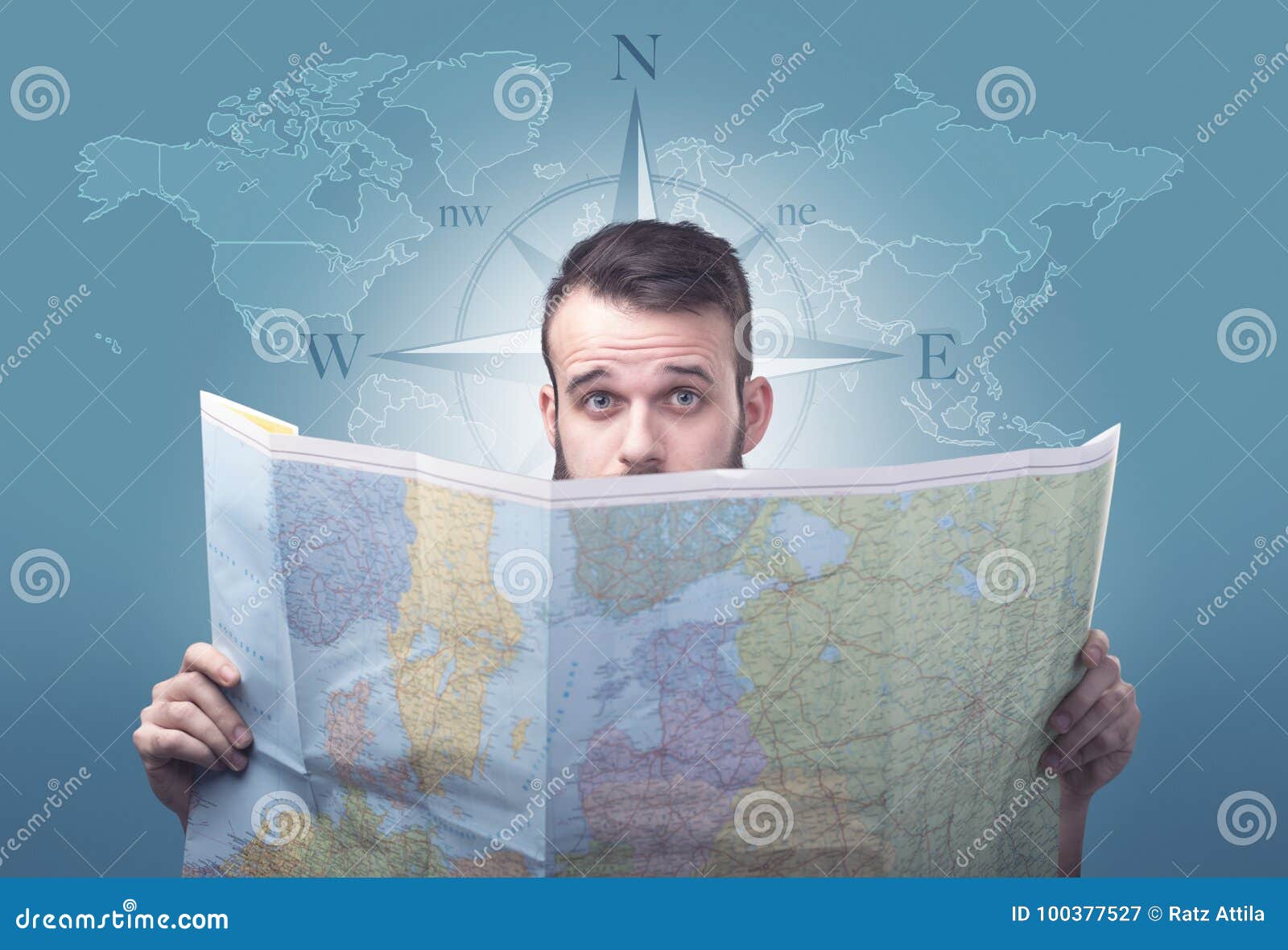 Young man holding map stock image. Image of blue, choice - 100377527
