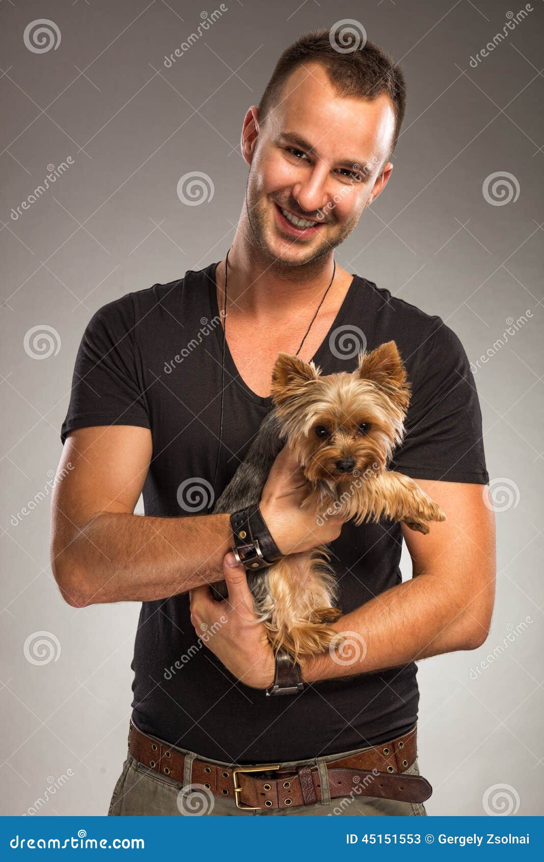 Handsome Young Man Holding a Yorkshire Terrier Dog Stock Image - Image ...