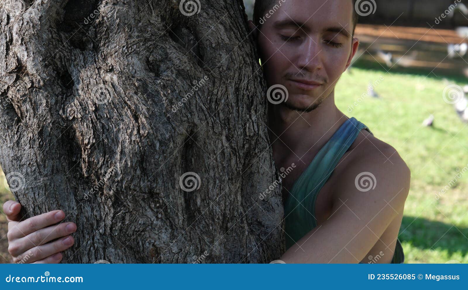 Handsome Young Man Hugging a Tree in the Forest Stock Image - Image of ...