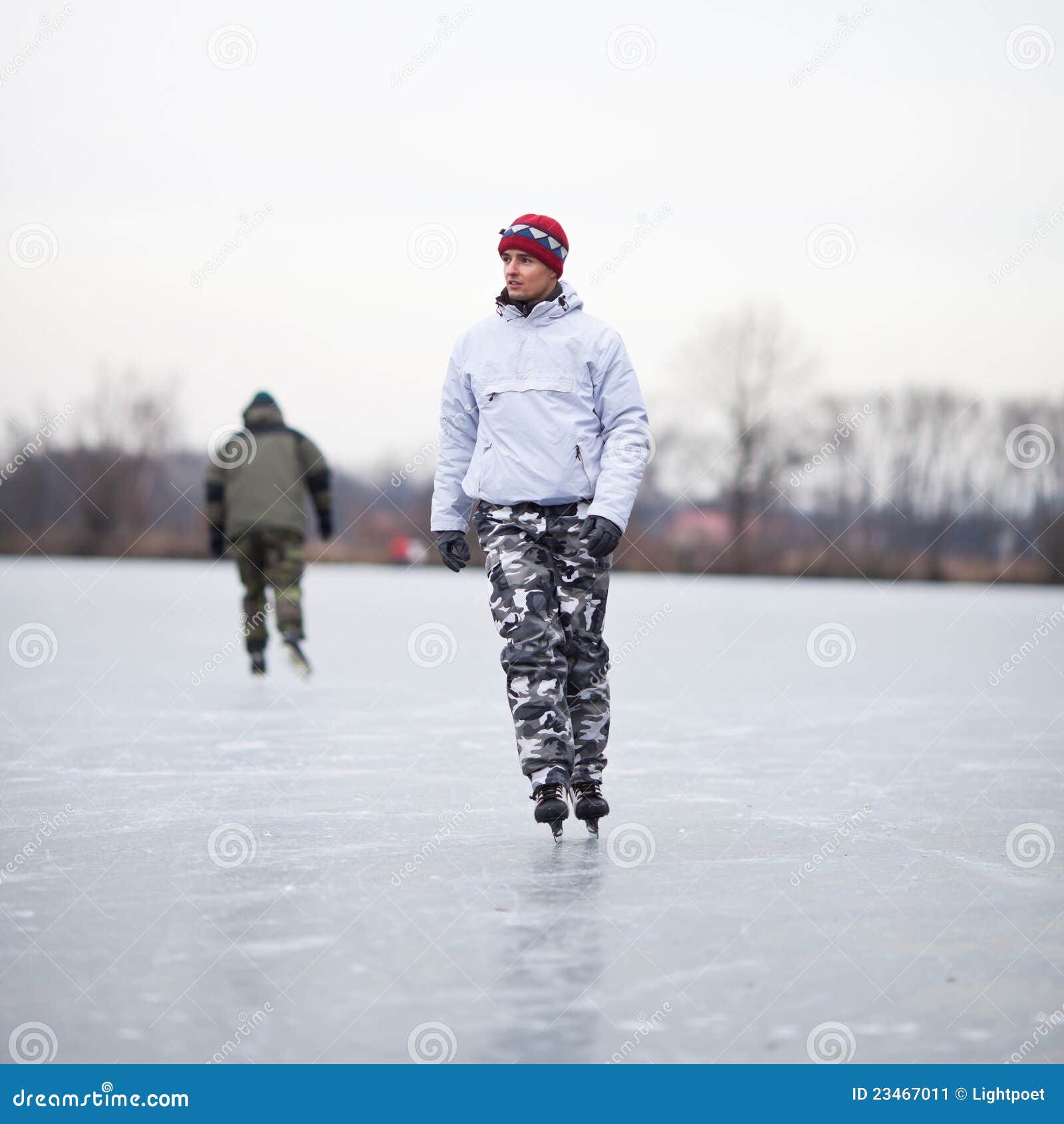 Handsome Young Man Ice Skating Outdoors on a Pond Stock Image - Image ...