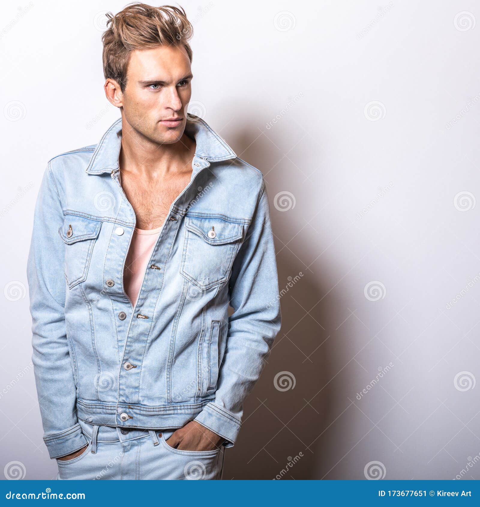 Handsome Young Man in Jeans Jacket Pose in Studio. Stock Image - Image ...