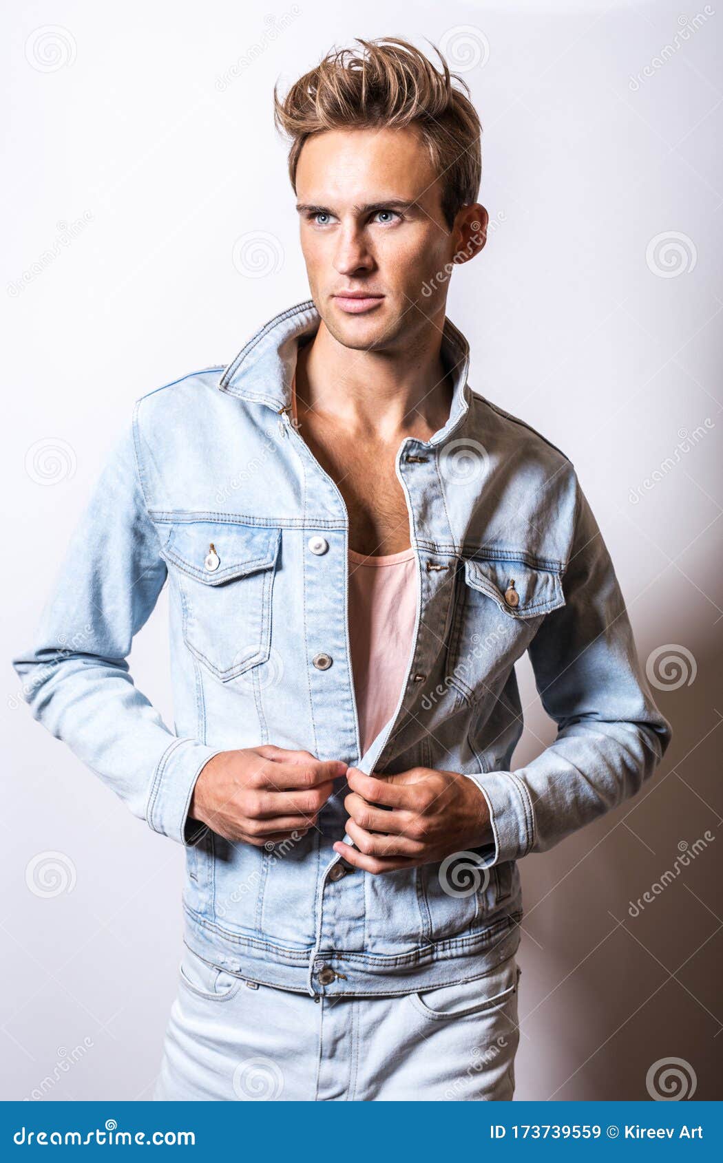 Handsome Young Man in Jeans Jacket Pose in Studio. Stock Image - Image ...