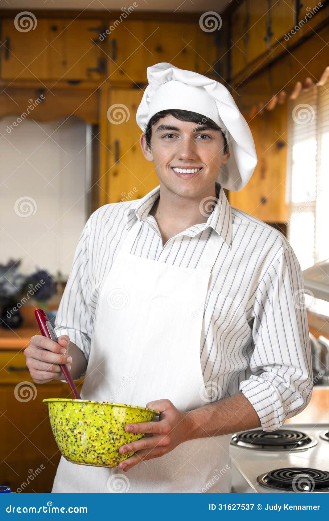 Handsome Young Man in Kitchen Stock Image - Image of looking, portrait ...
