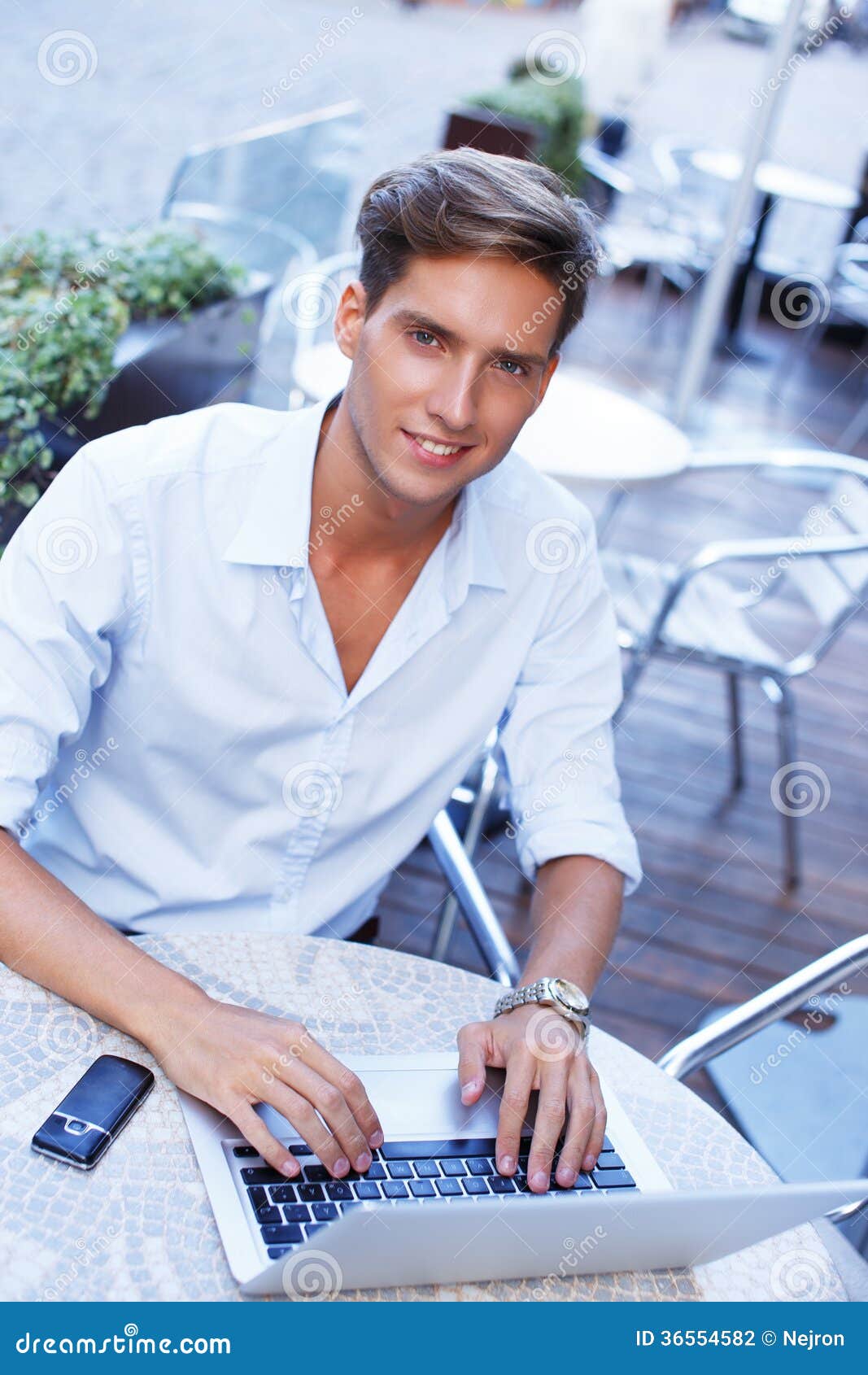 Handsome Young Man with Laptop Stock Photo - Image of male, laptop ...