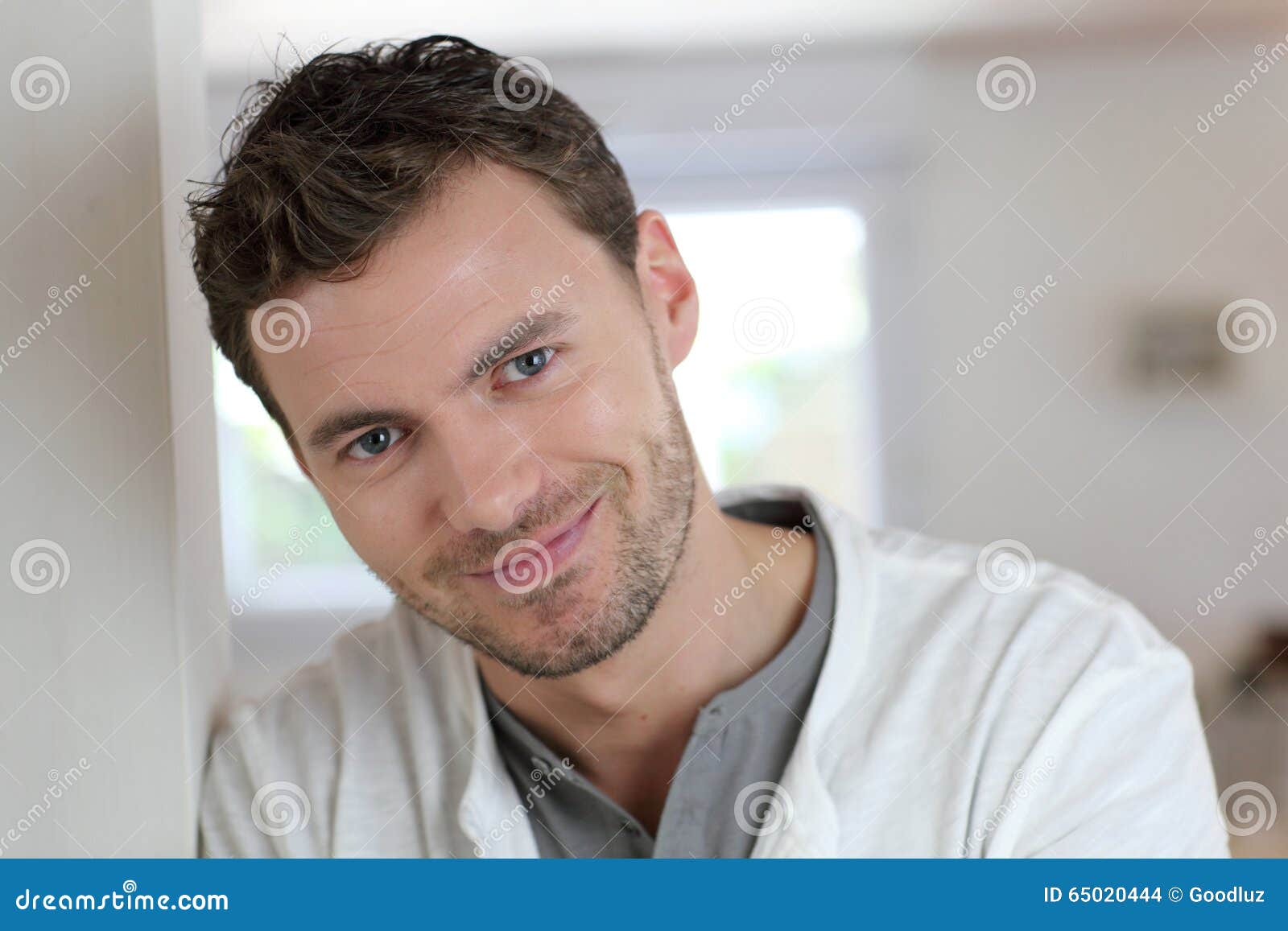 Handsome Young Man Leaning on the Wall Stock Photo - Image of ...
