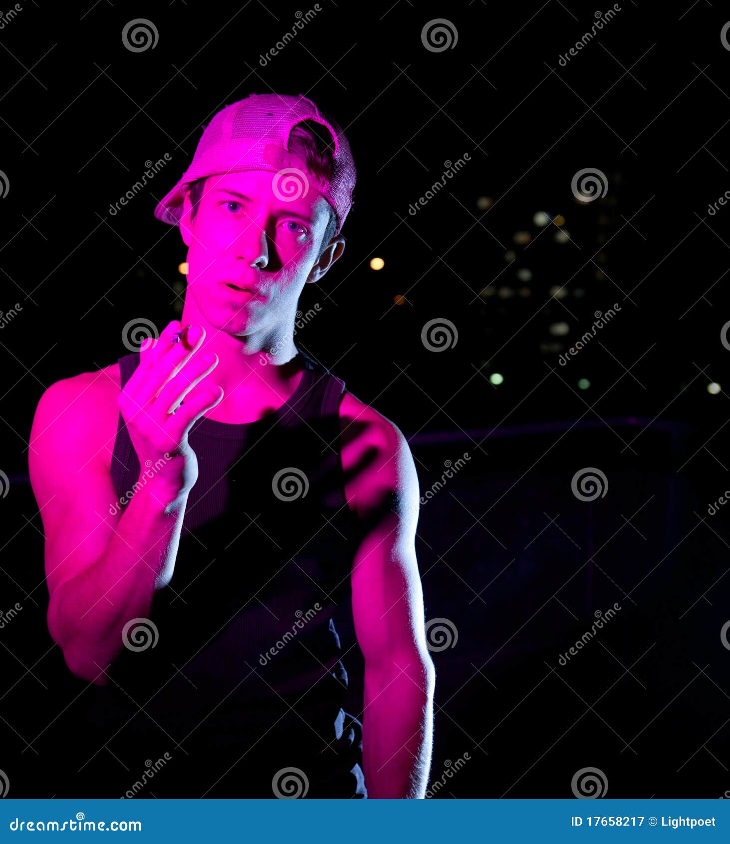 Handsome Young Man Lit with Colorful Lights Stock Image - Image of ...
