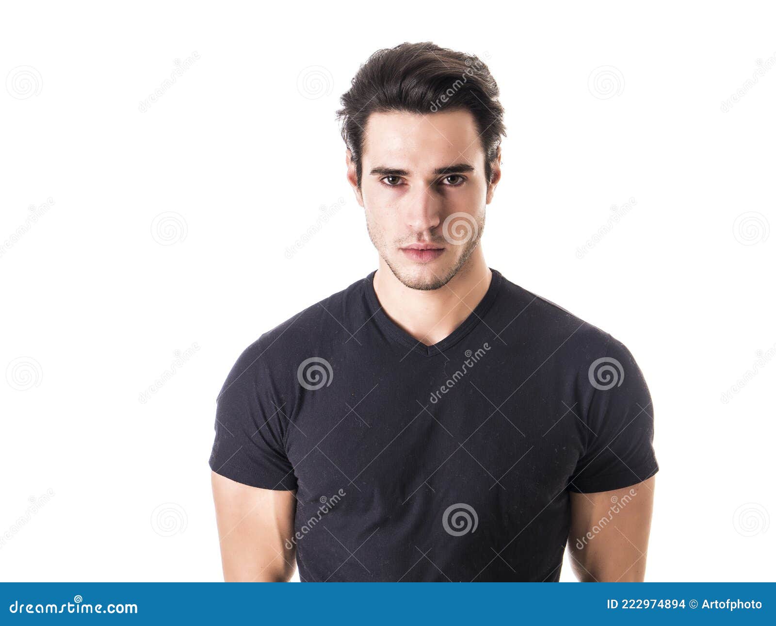 Handsome Young Man Looking at Camera in Studio Stock Photo - Image of ...