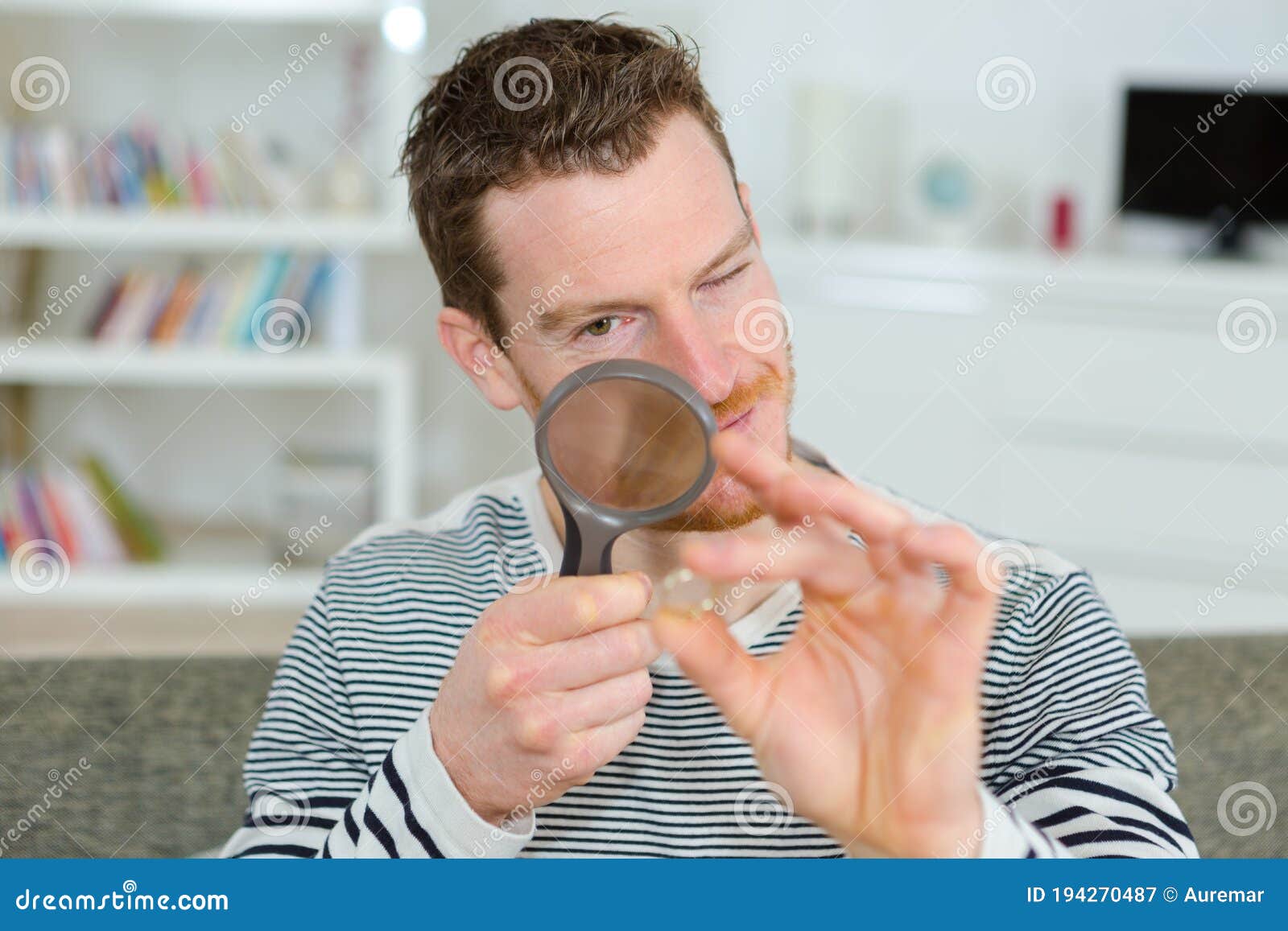 Handsome Young Man Looking at Precious Ring through Magnifying Glass ...