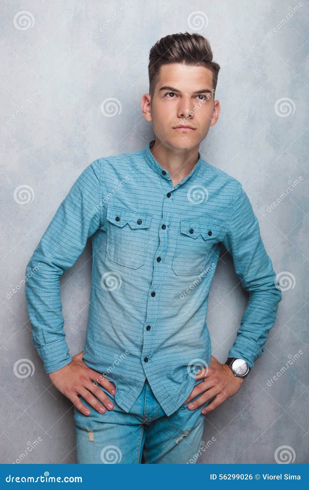 Handsome Young Man Looking Up. Stock Photo - Image of style, blue: 56299026