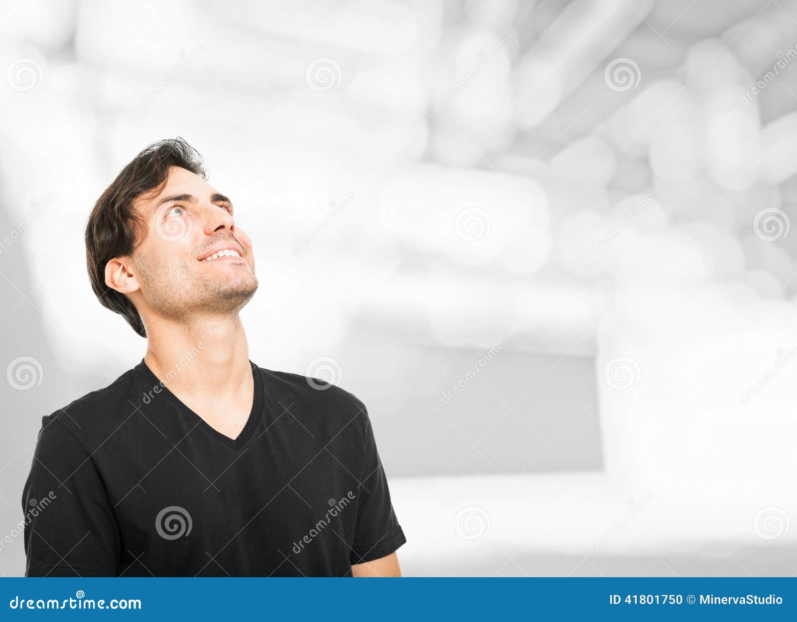 Handsome Young Man Looking Up Stock Photo - Image of advertisement ...