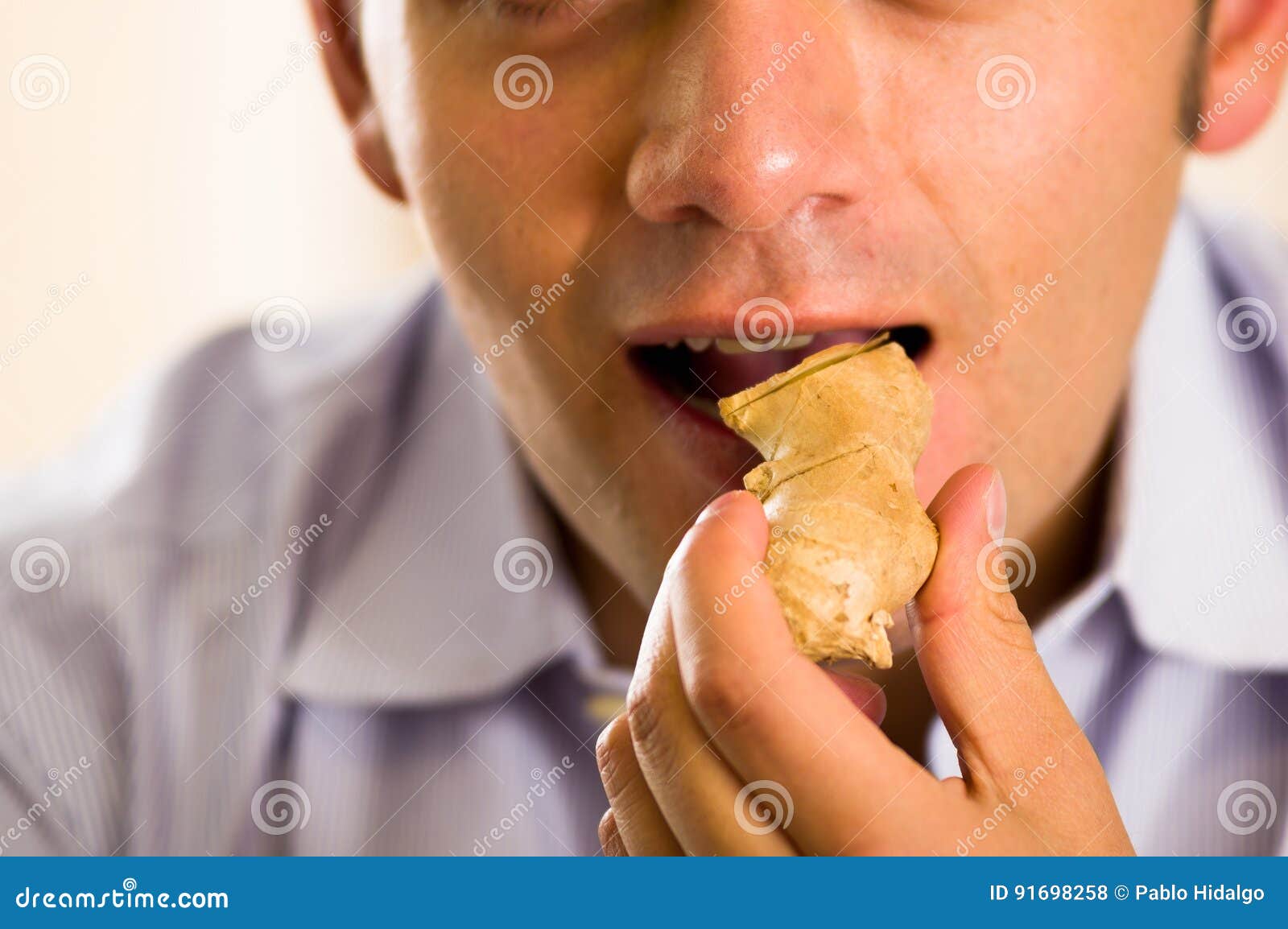 Handsome Young Man Loves Eat a Piece Ginger Stock Photo - Image of ...